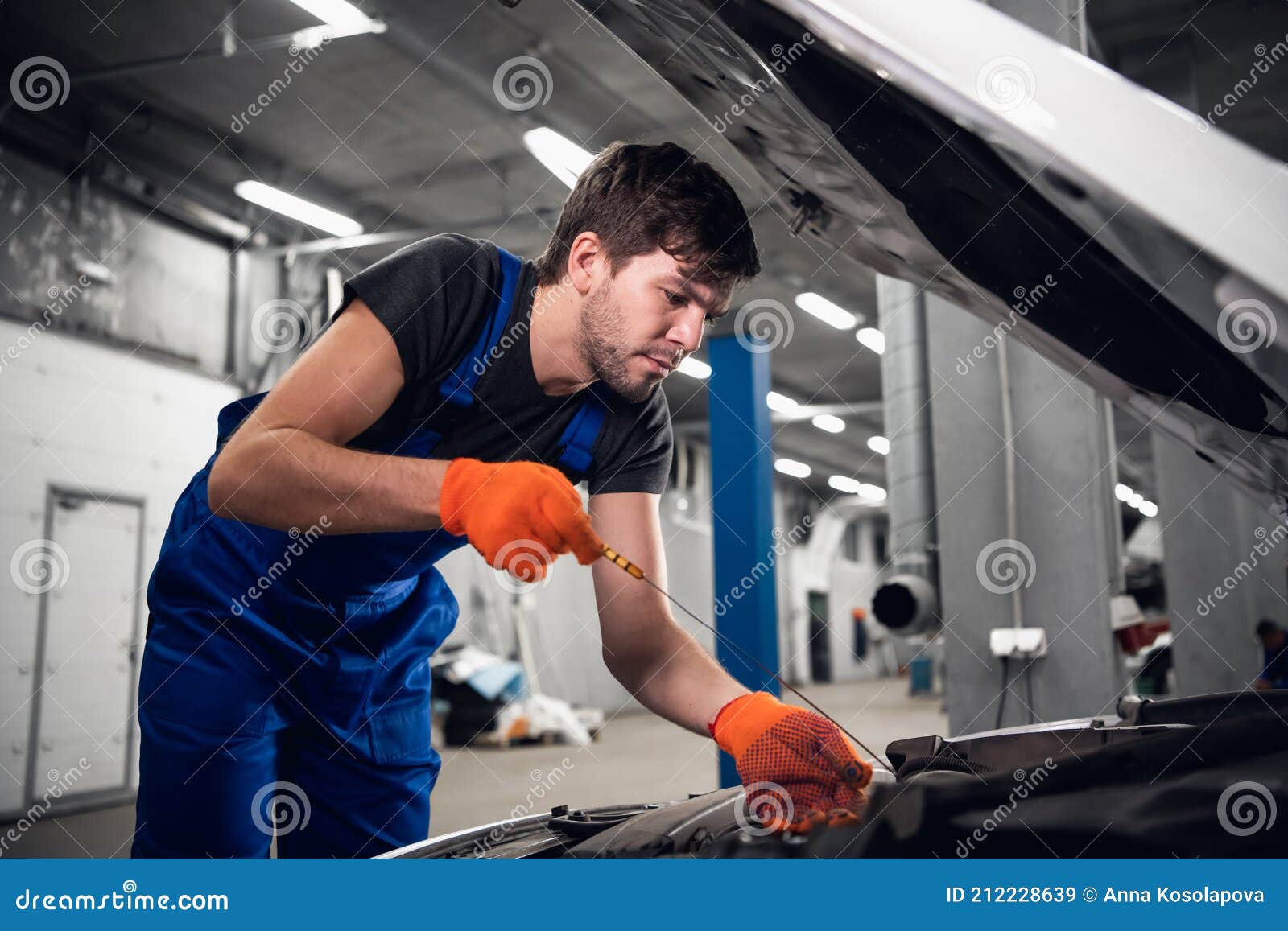 A Worker Uses Tools To Fix a Car Engine Stock Image - Image of repair ...