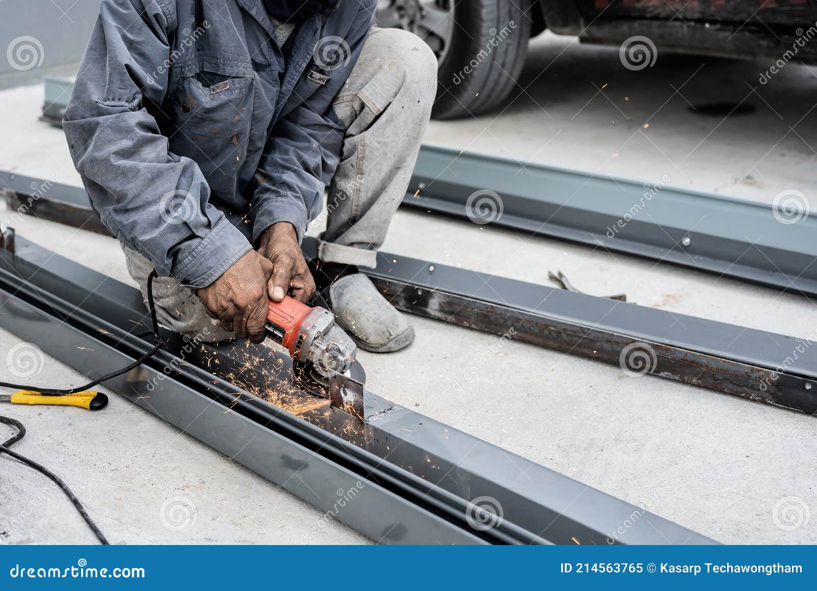 Worker Using Angle Grinder Machine Cutting Metal in Factory Stock Image ...