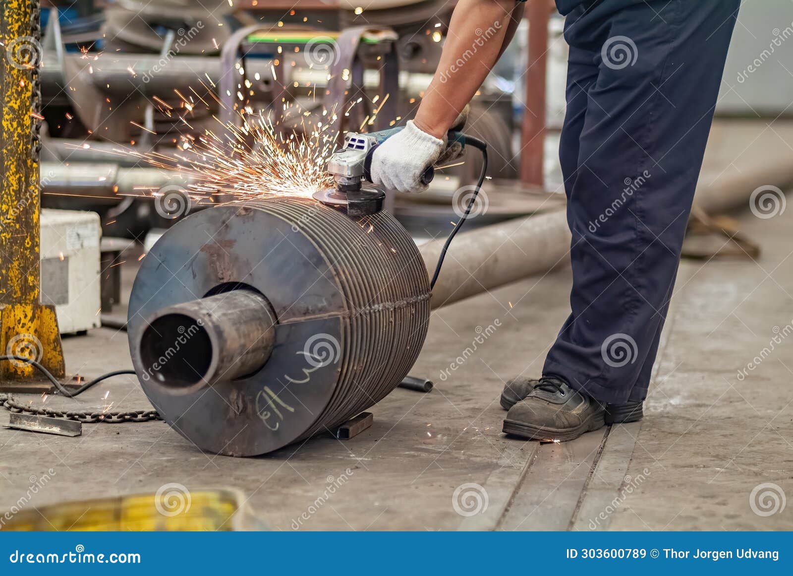 Worker Using an Angle Grinder, Making a Conveyor Stock Image - Image of ...