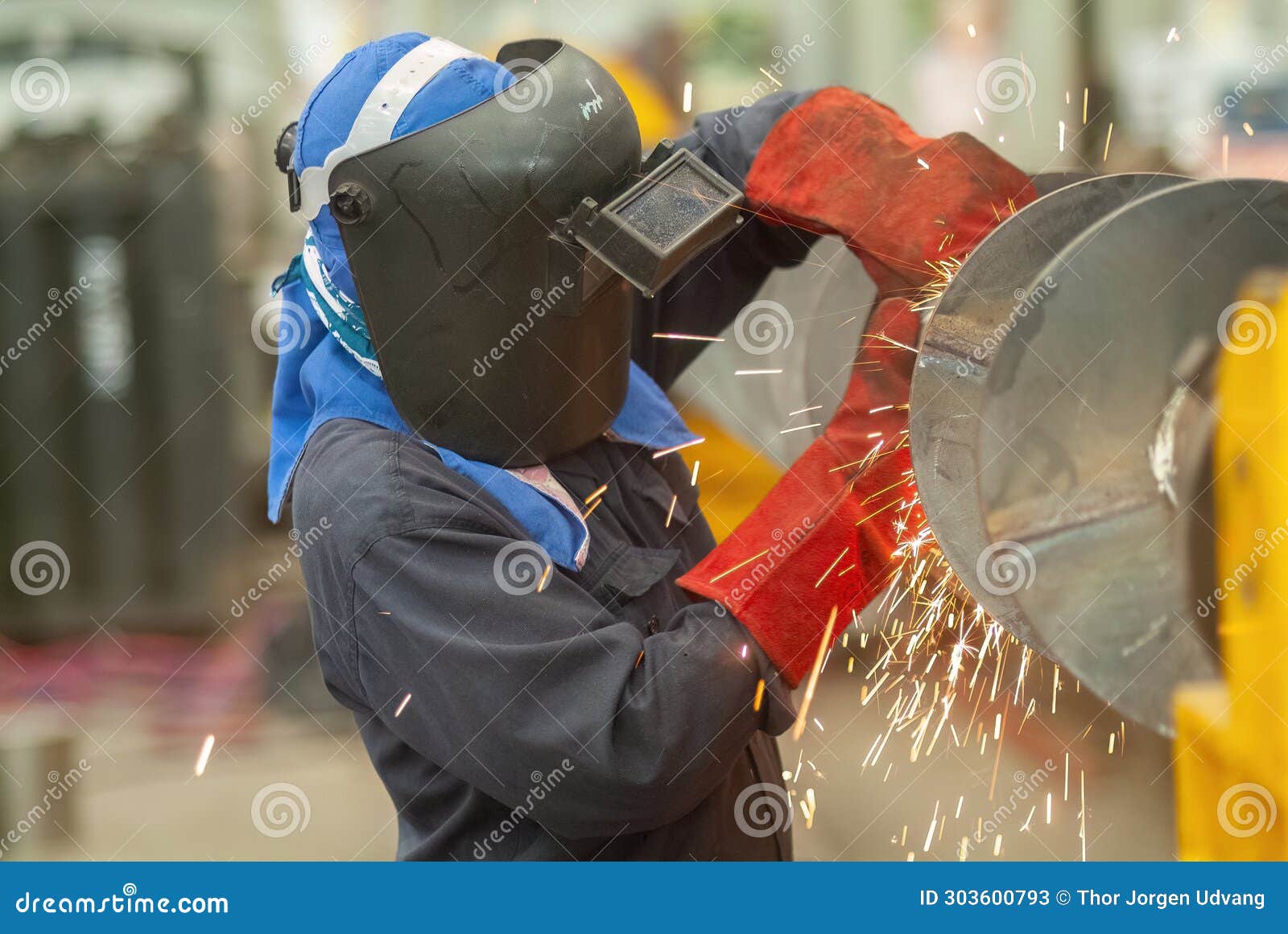 Worker Using an Angle Grinder, Making a Conveyor Stock Image - Image of ...