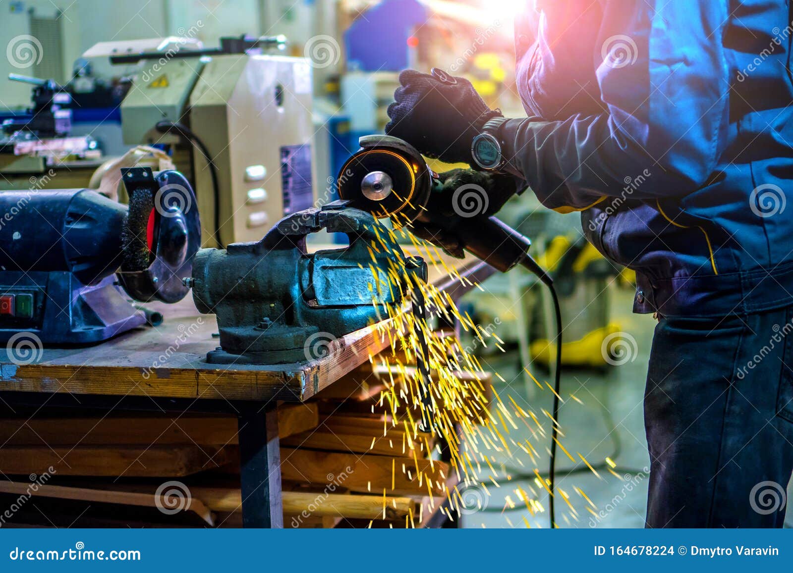 Worker Using an Angle Grinder for Sharpening a Metal Stock Photo ...