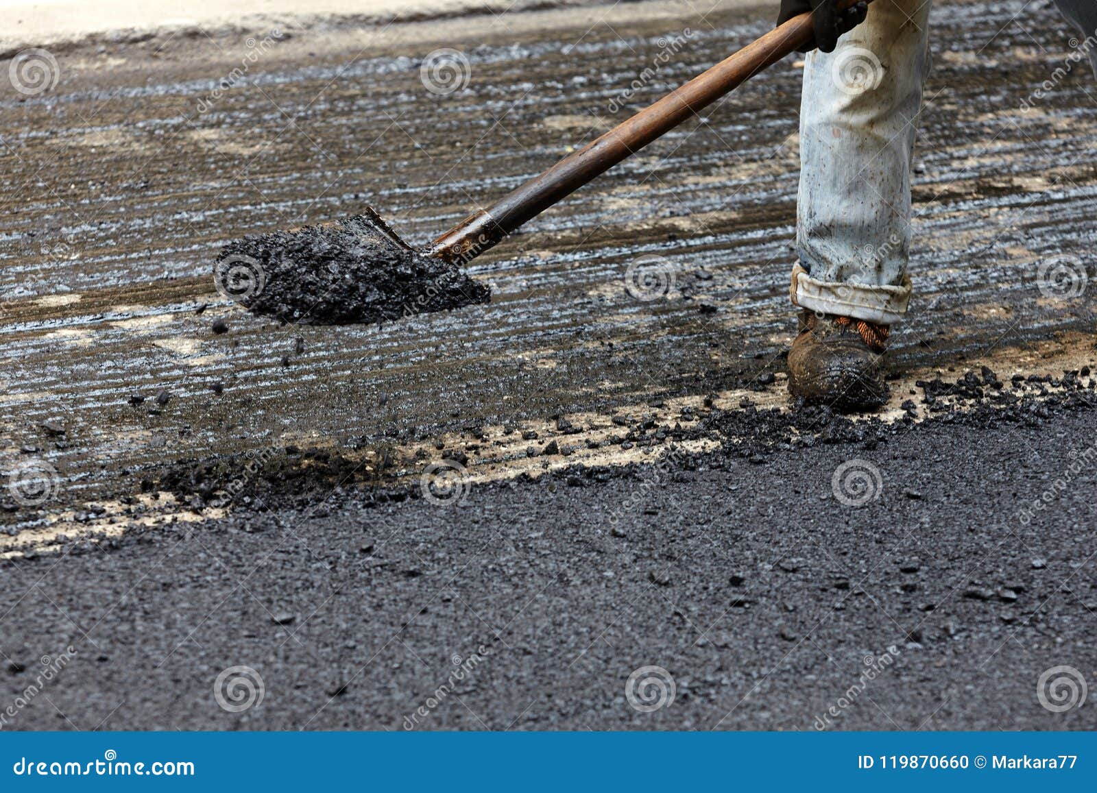 Worker Using Asphalt Paver Tool during Road Construction. Stock Photo ...