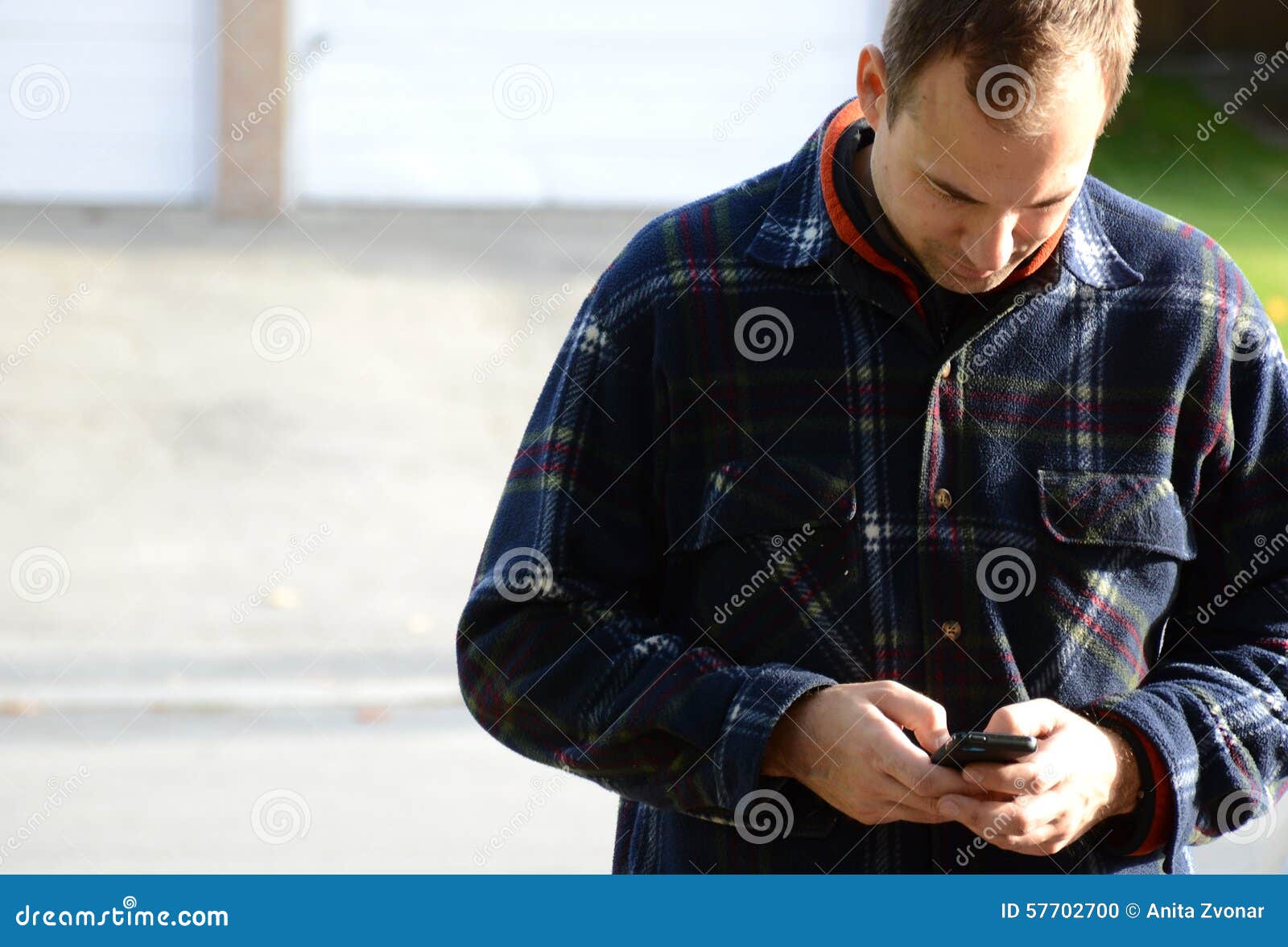 Worker using cell phone stock photo. Image of blue, collar - 57702700