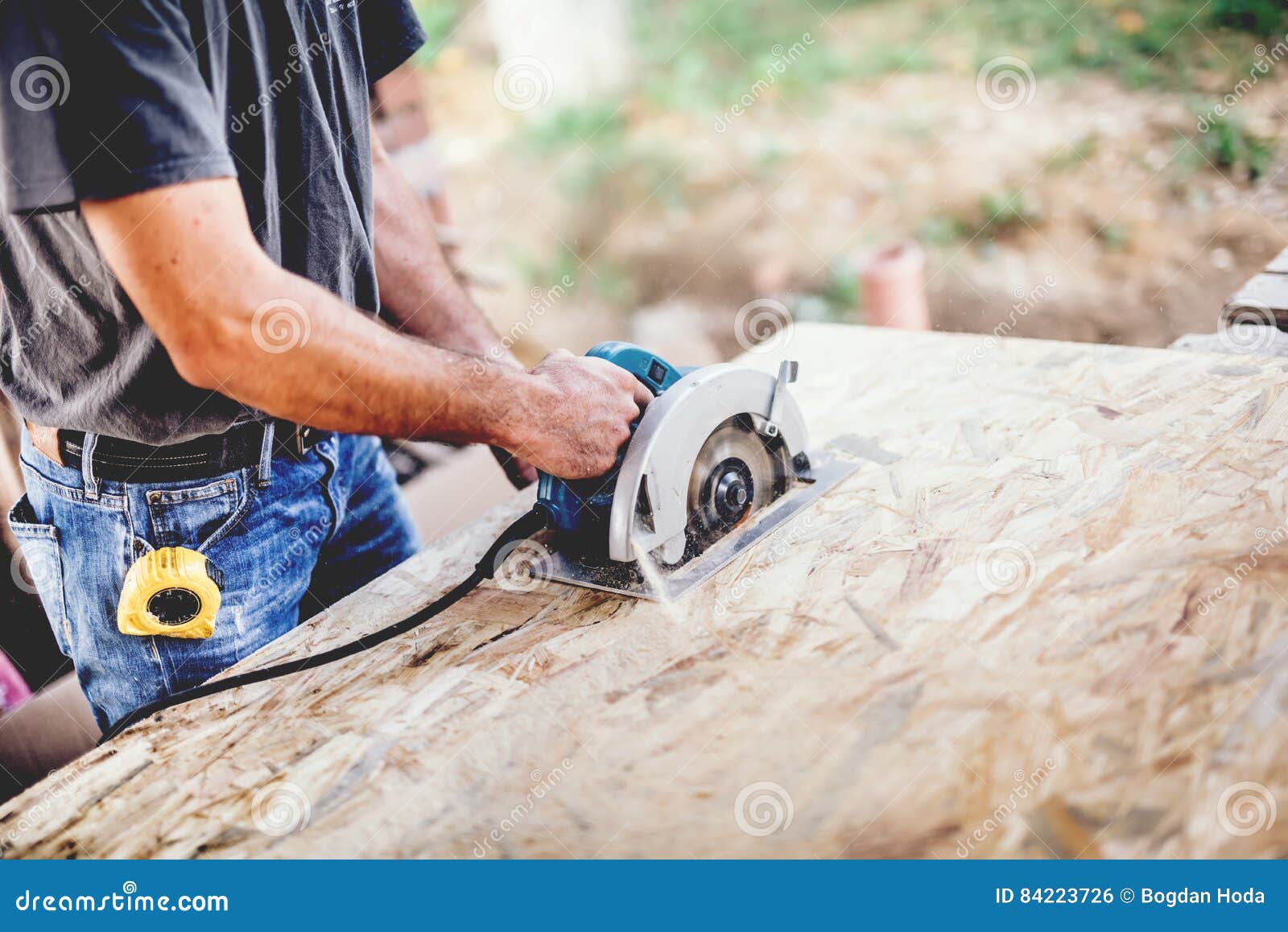 Worker Using Circular Saw on Wooden Board in Carpentry Workshop Stock ...