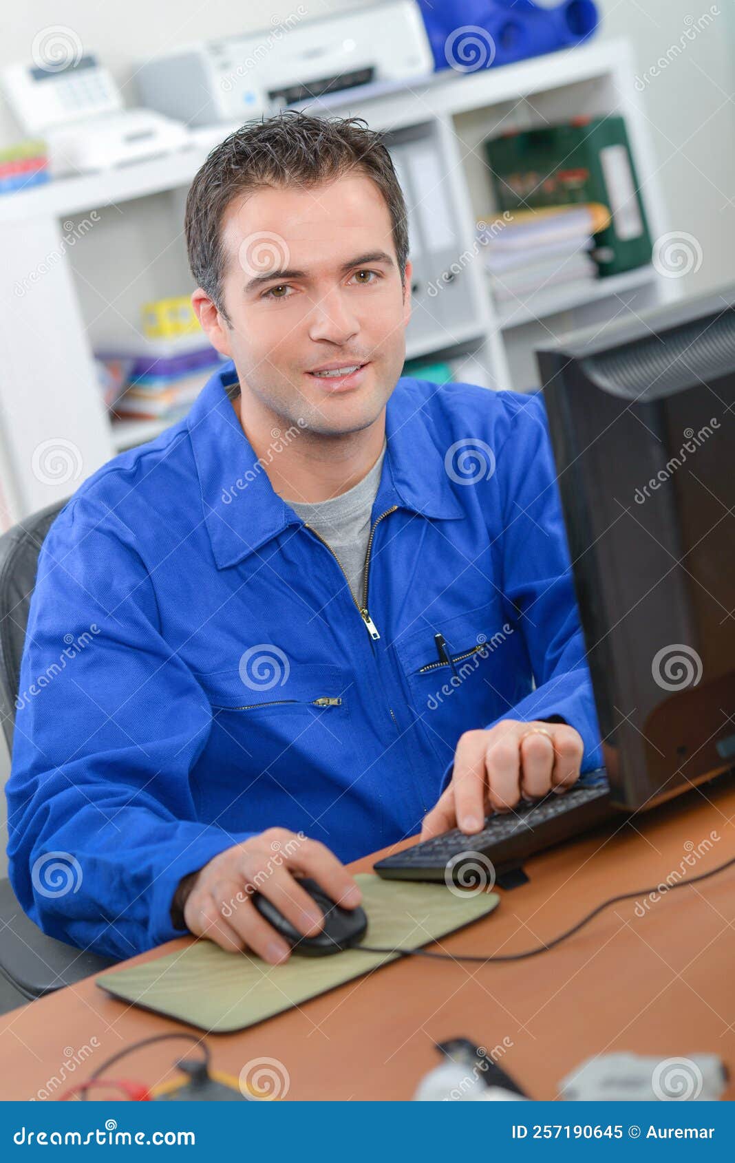 Worker using a computer stock image. Image of male, renovation - 257190645