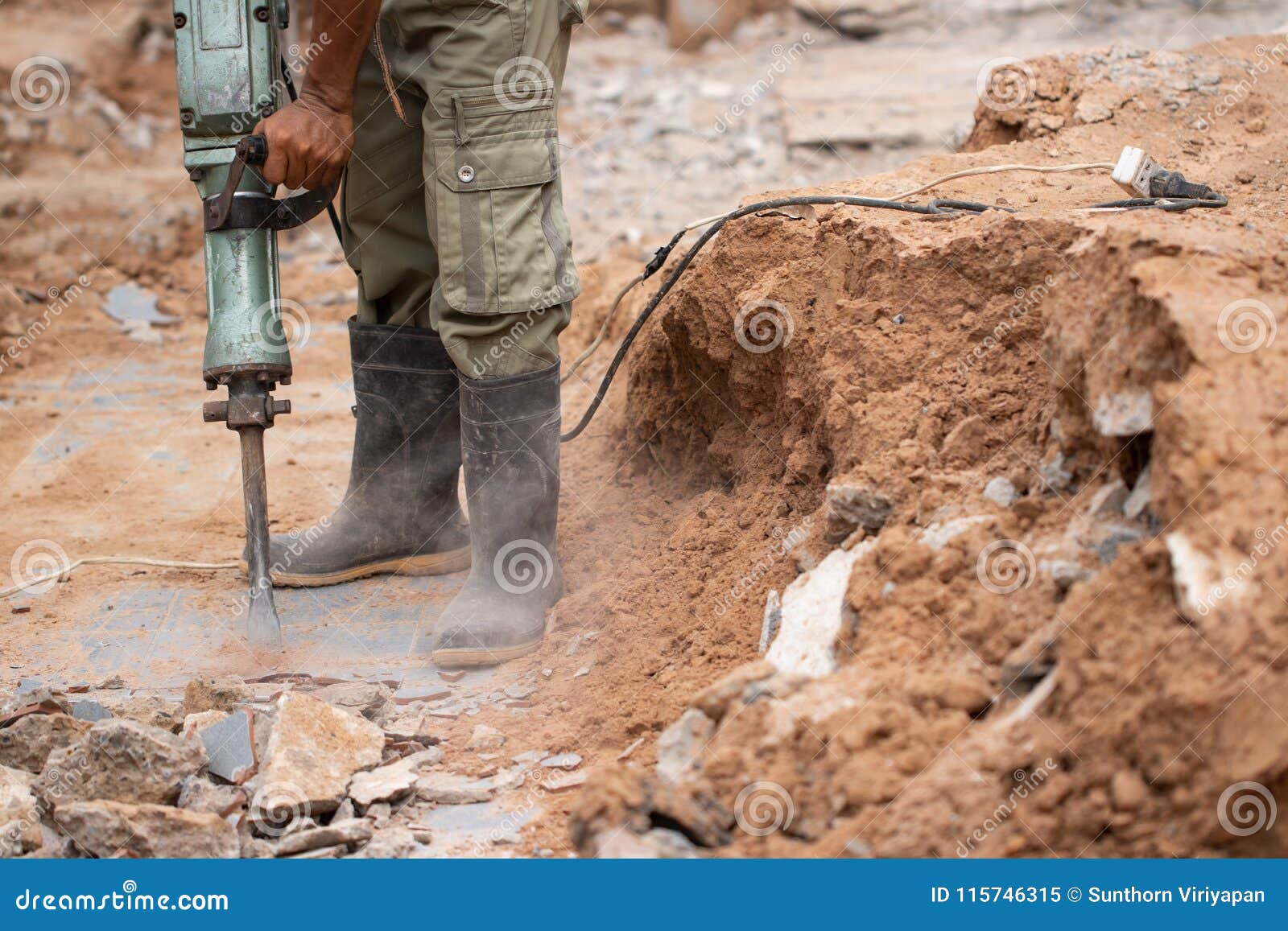 Worker Using Concrete Extractor Machine To Destroy Concrete Stock Image ...