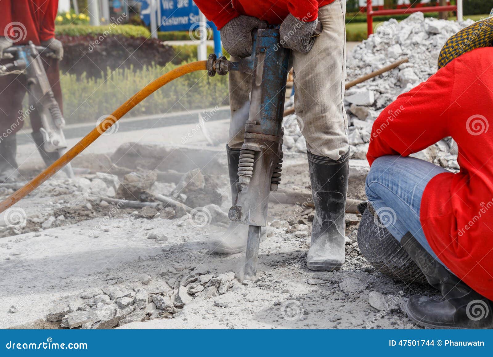 Worker Using Construction Drilling Cement on the Ground Stock Photo ...