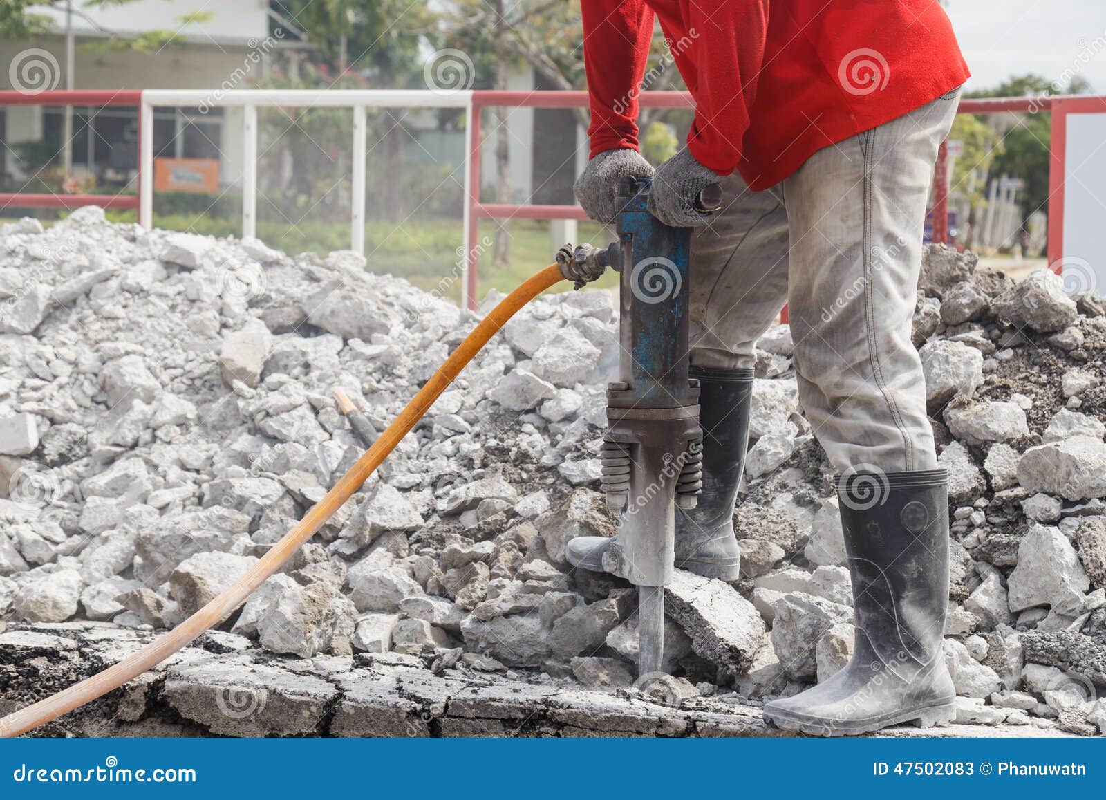 Worker Using Construction Drilling Cement on the Ground Stock Image ...