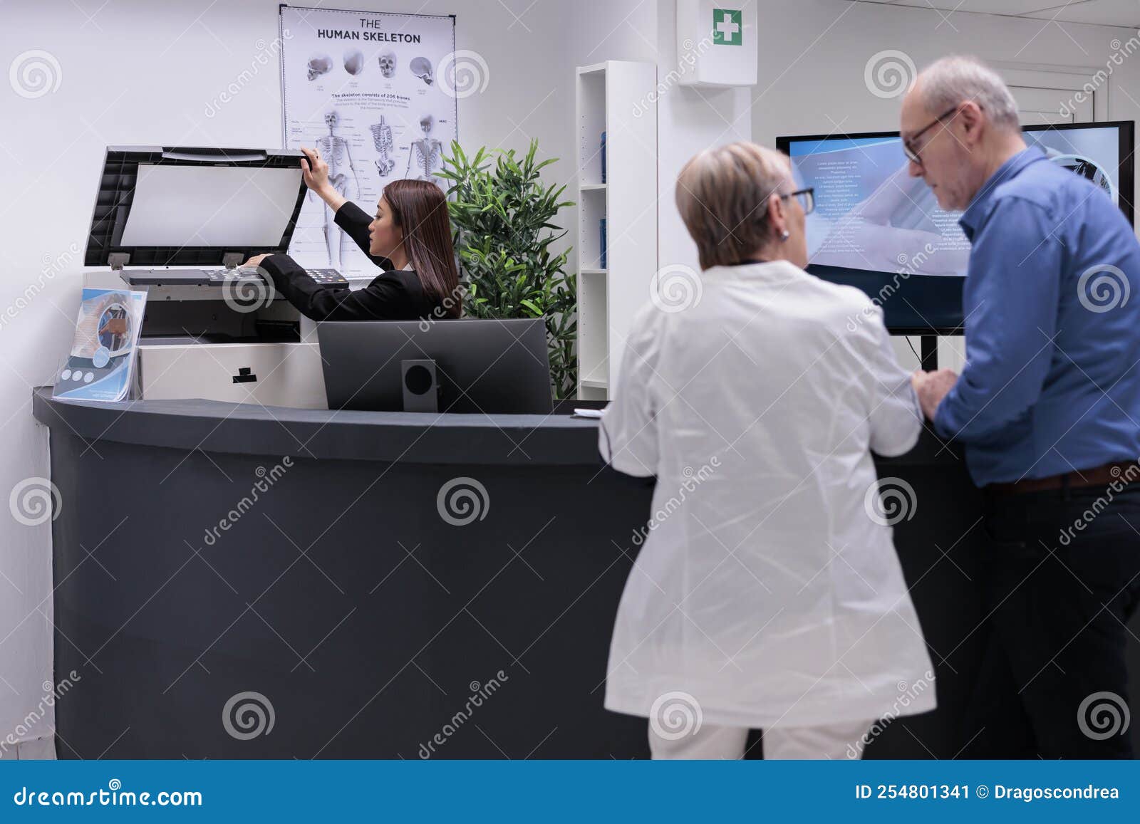 Worker Using Copy Printer at Reception Desk Stock Image - Image of ...