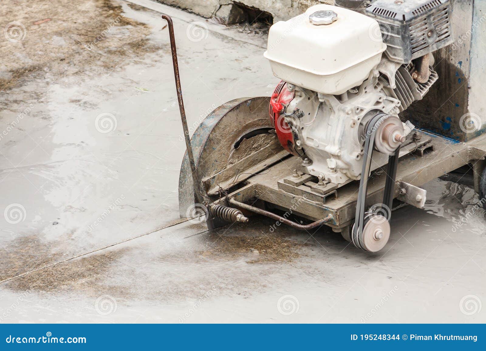 Worker Using Diamond Saw Blade Machine Cutting Concrete Road at ...