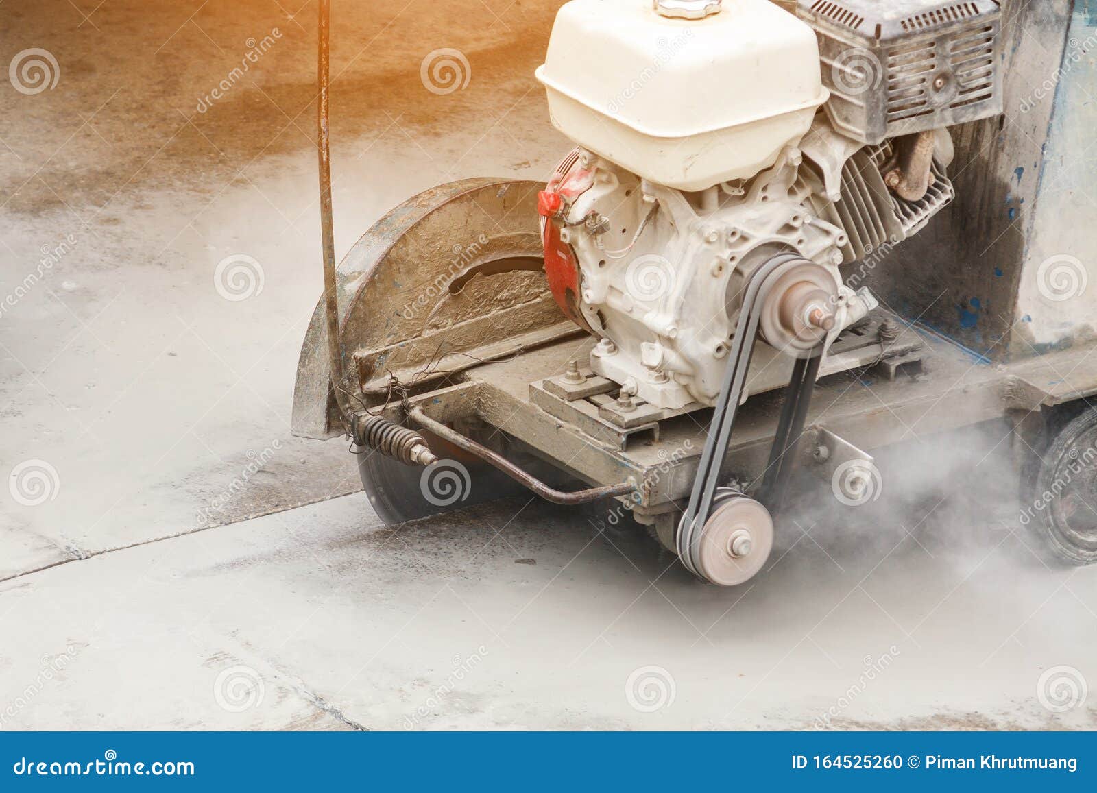 Worker Using Diamond Saw Blade Machine Cutting Concrete Road at ...