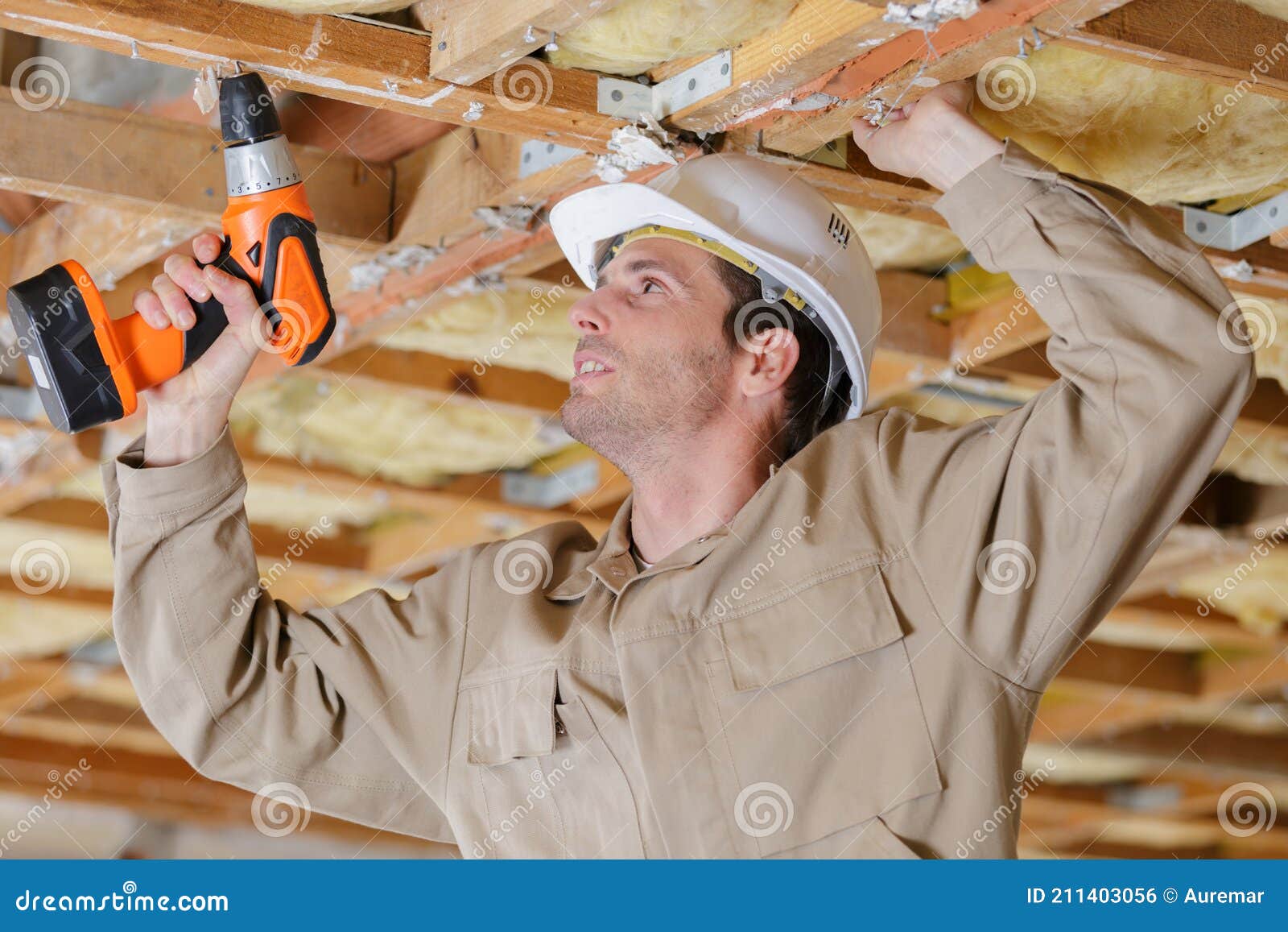 Worker Using Drill in Ceiling Stock Photo - Image of drill, plastic ...