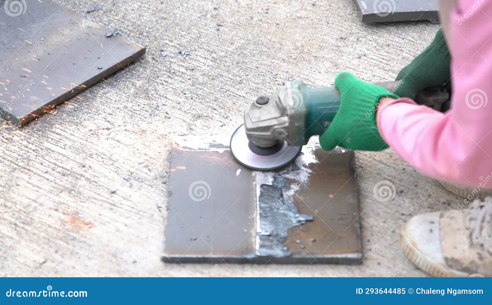 Worker Using Electric Wheel Grinding Disc Grinds Metal Plate in ...