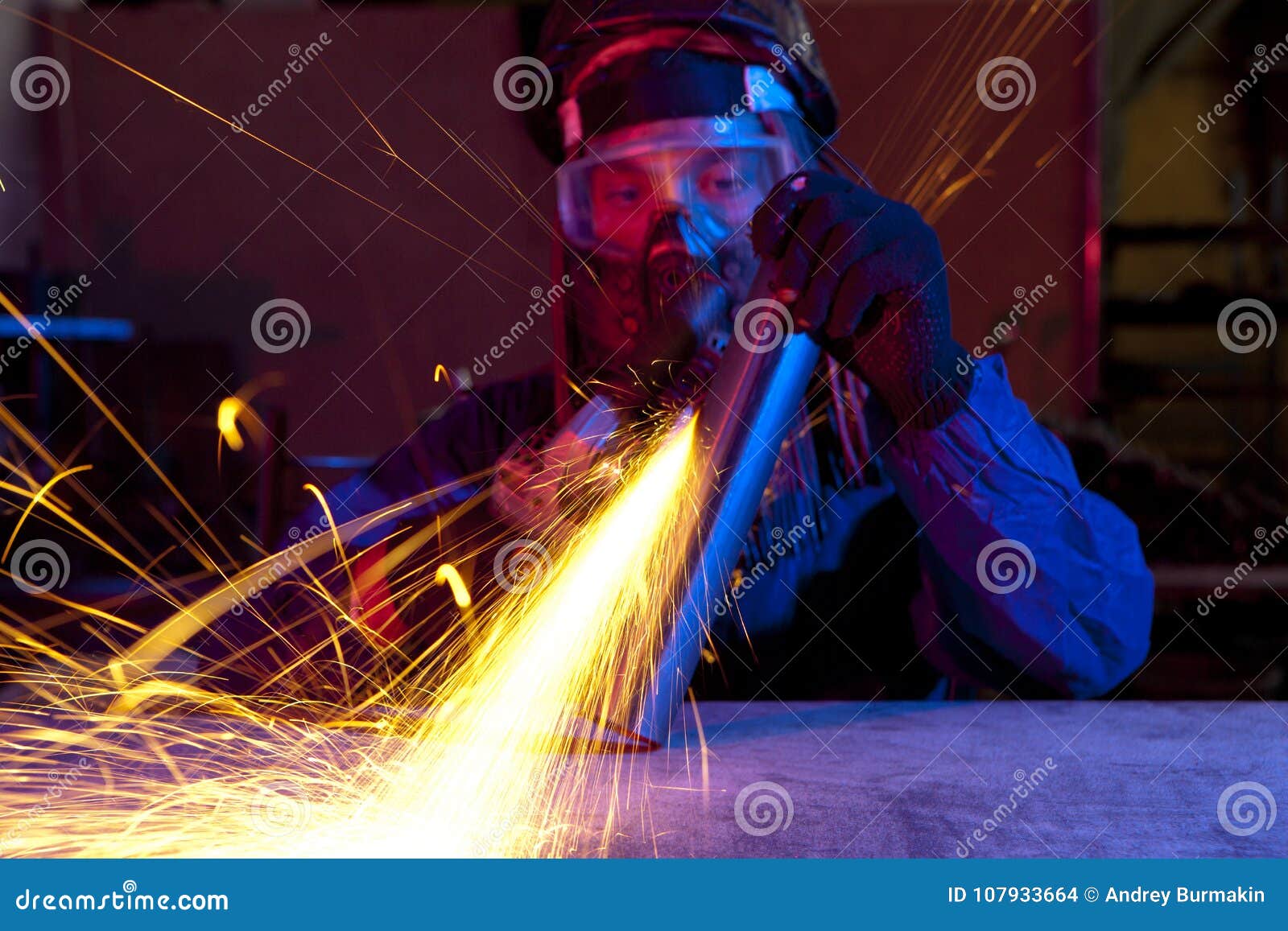 Worker using a grinder stock photo. Image of join, factory - 107933664