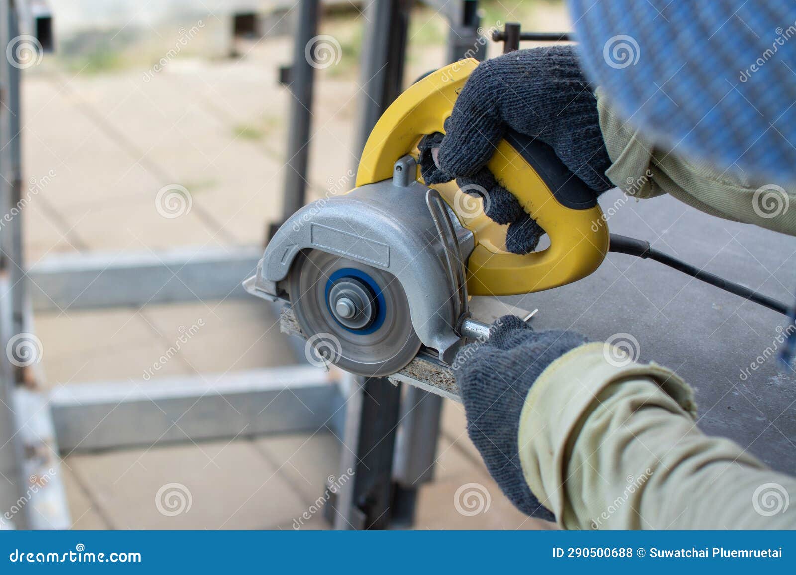 Worker Using a Grinding Machine for Cut Cement Board Stock Photo ...