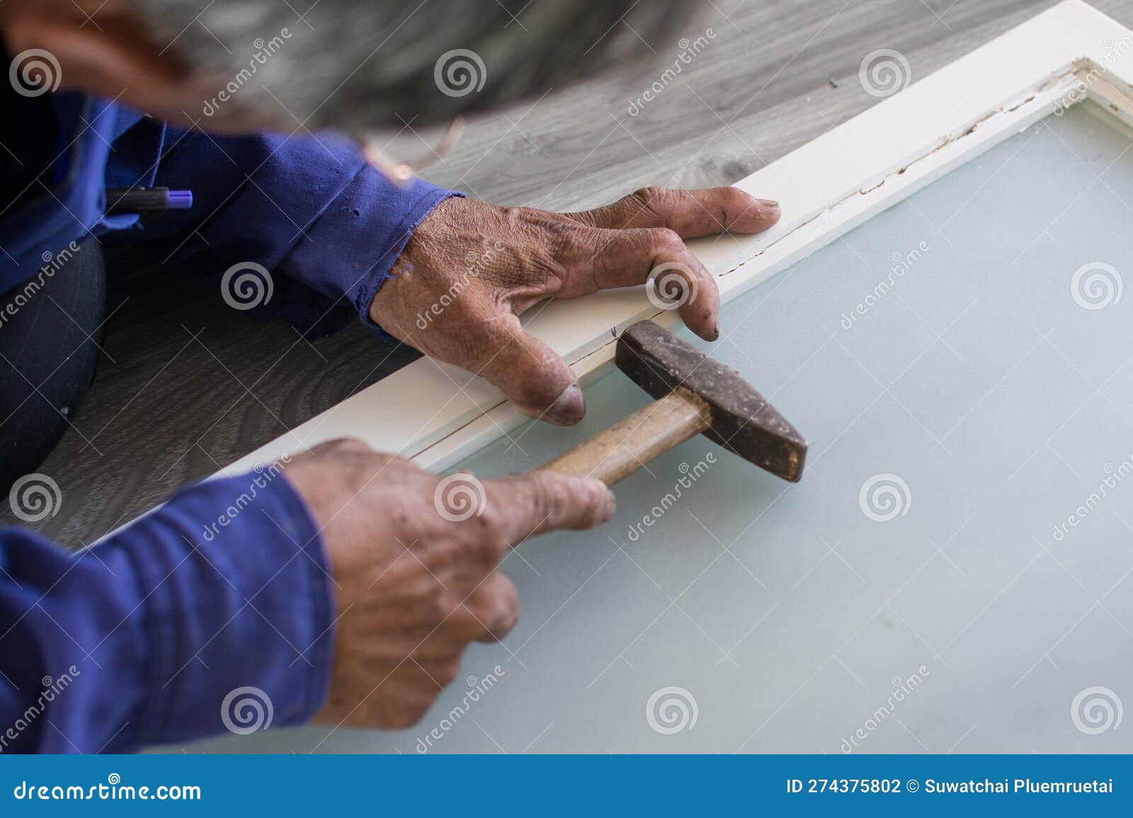 Worker Using a Hammer in Woodwork Construction Stock Photo - Image of ...