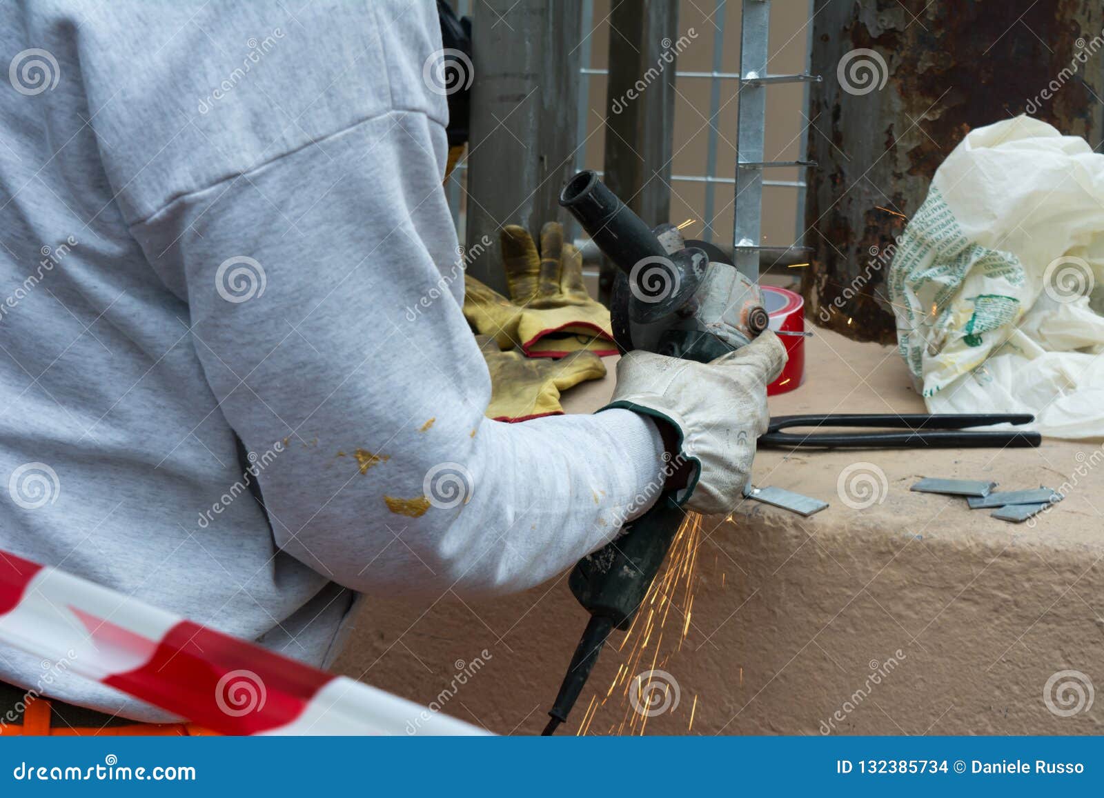 Worker Using an Orbital Grinder on Steel Surface Stock Photo - Image of ...