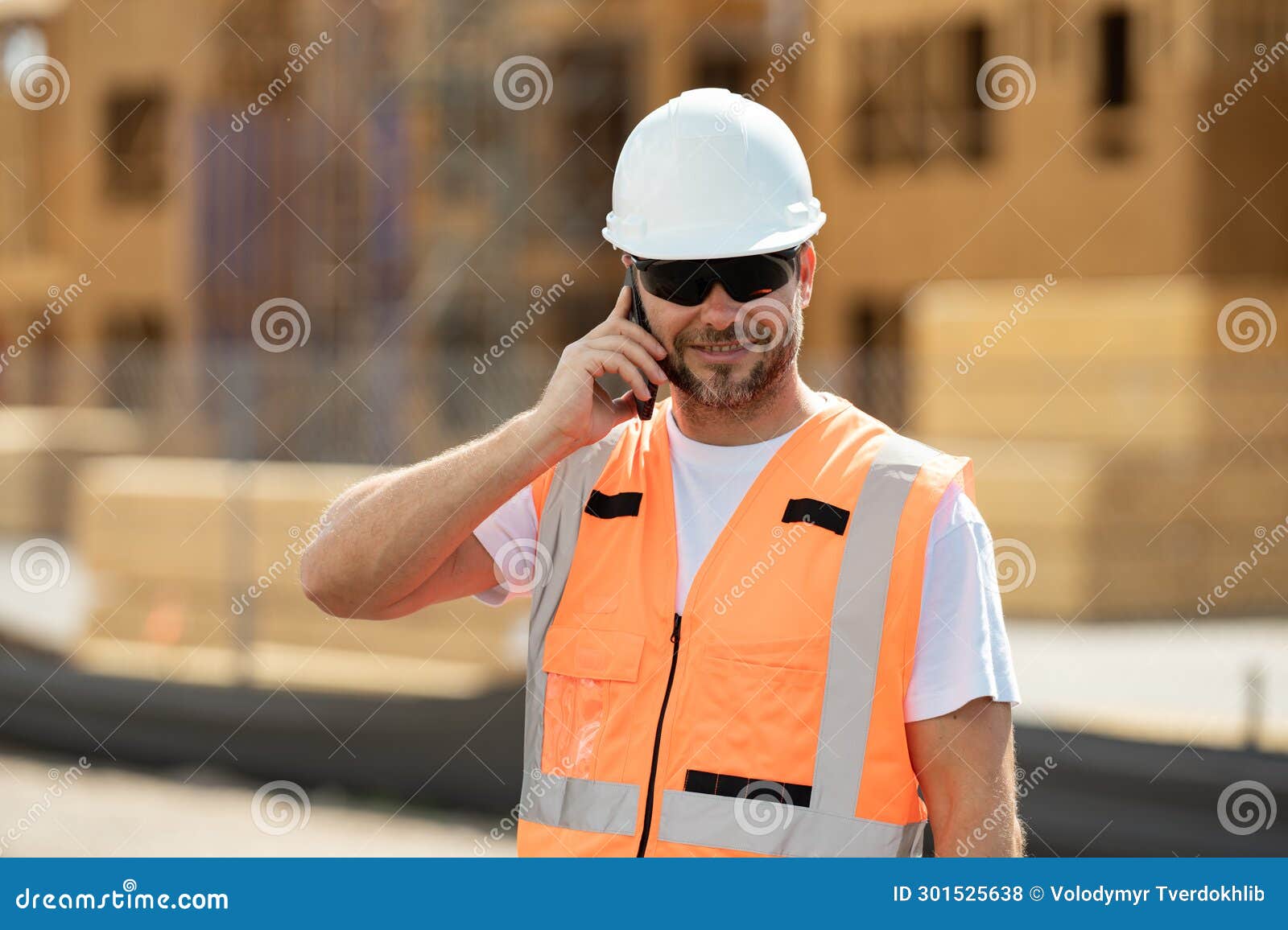 Worker Using Phone, Builder Taking on Phone a Break from Work ...