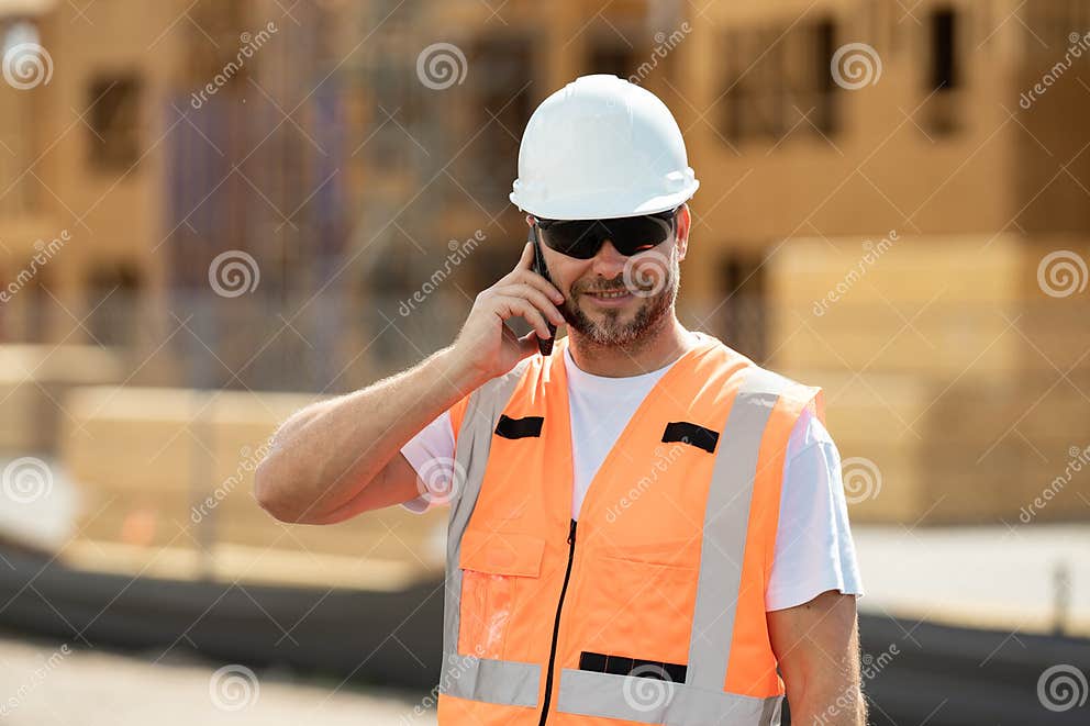 Worker Using Phone, Builder Taking on Phone a Break from Work ...