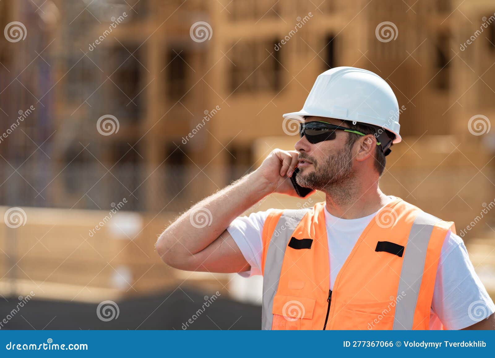 Worker Using Phone, Builder Taking on Phone a Break from Work ...