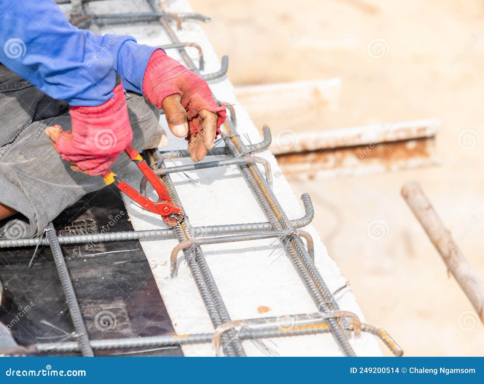 Worker Using Pliers for Bundle of Steel Rebar Stock Photo - Image of ...