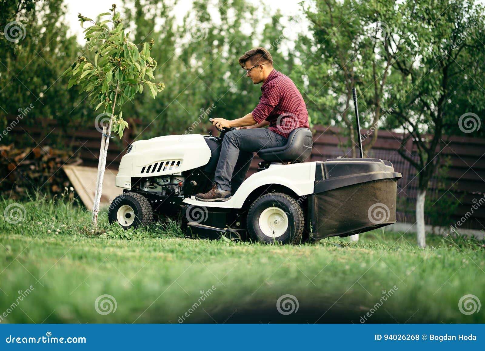Worker Using Professional Grass Trimmer, Lawn Mower Stock Photo - Image ...
