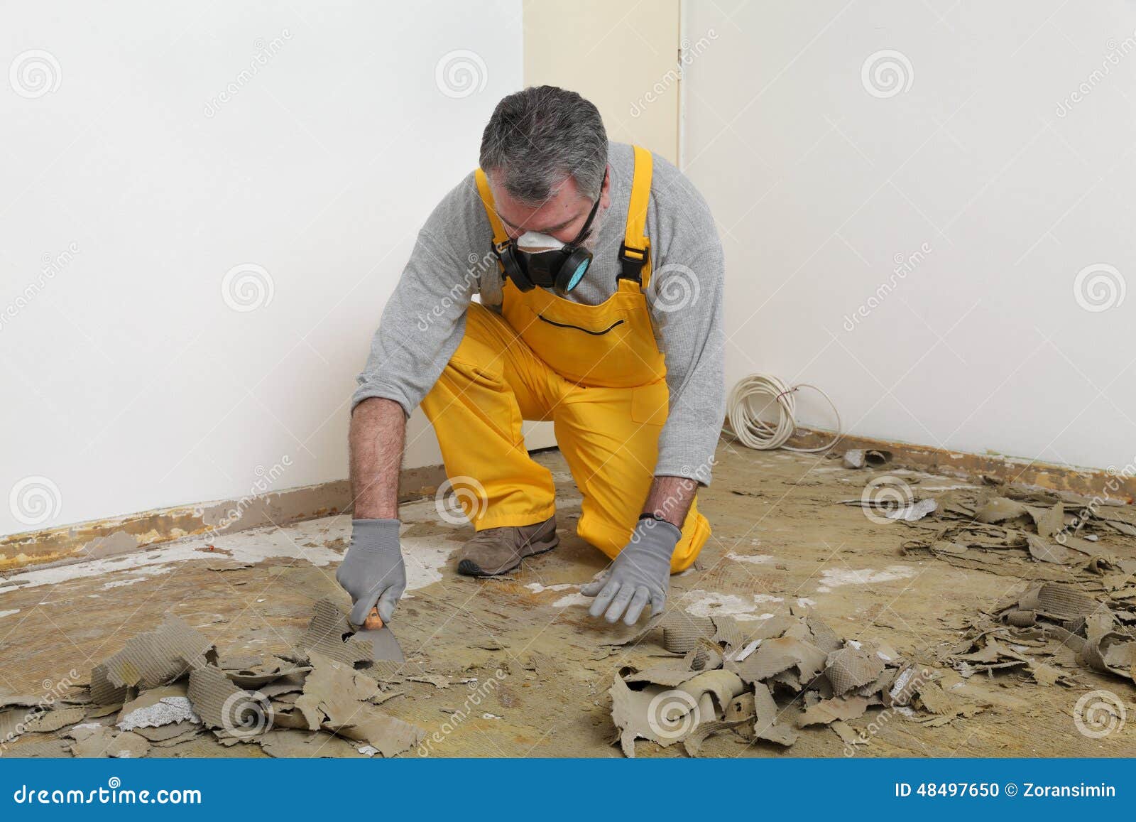 Worker Using Putty Knife for Cleaning Floor Stock Photo - Image of ...