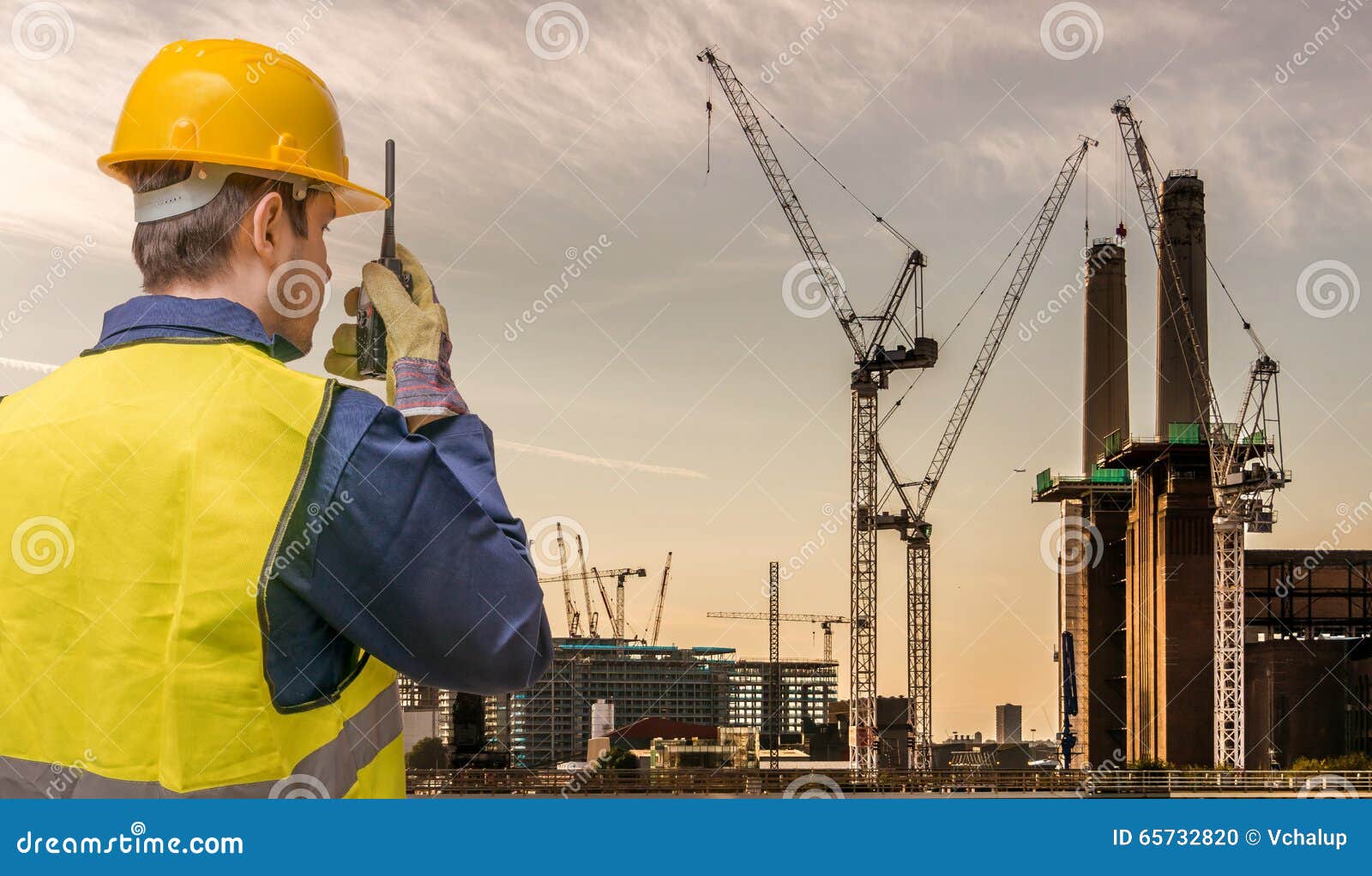 Worker is Using Radio and Crane Site. Construction Concept Stock Photo ...
