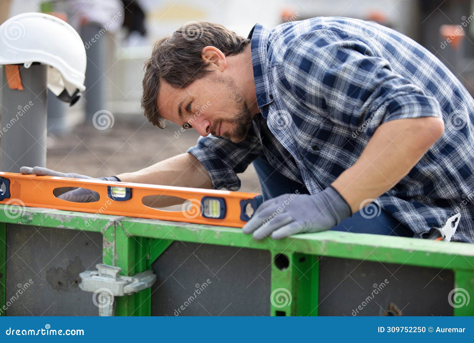 Worker Using Spirit Level on Wall Stock Photo - Image of profession ...