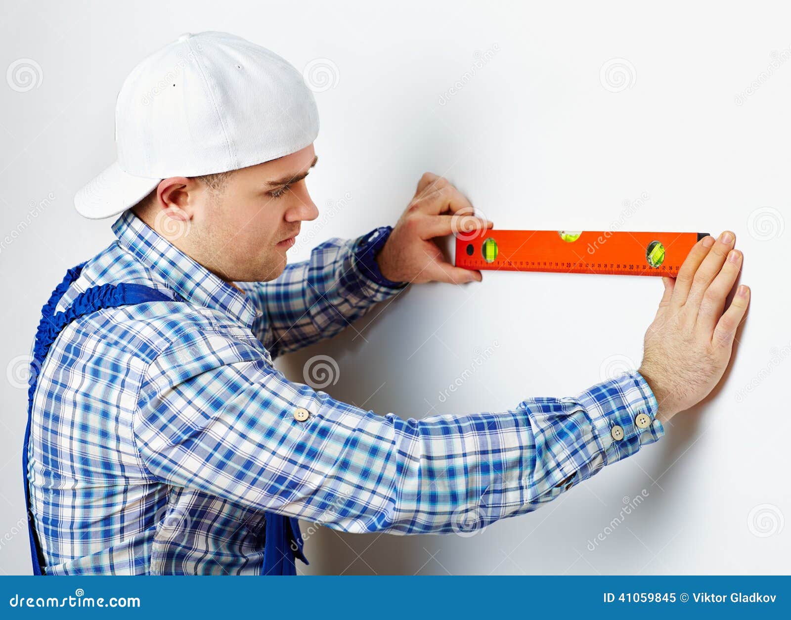 Worker using spirit level stock image. Image of isolated - 41059845