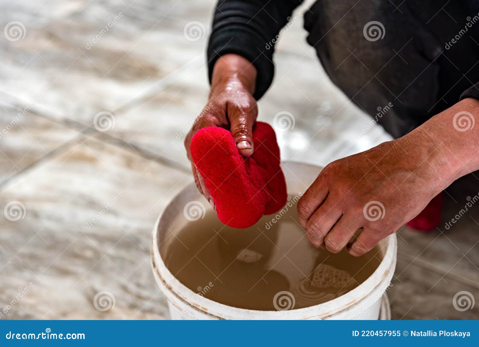 Worker Using a Sponge Rub Washing Tiles after Jointing. Stock Image ...