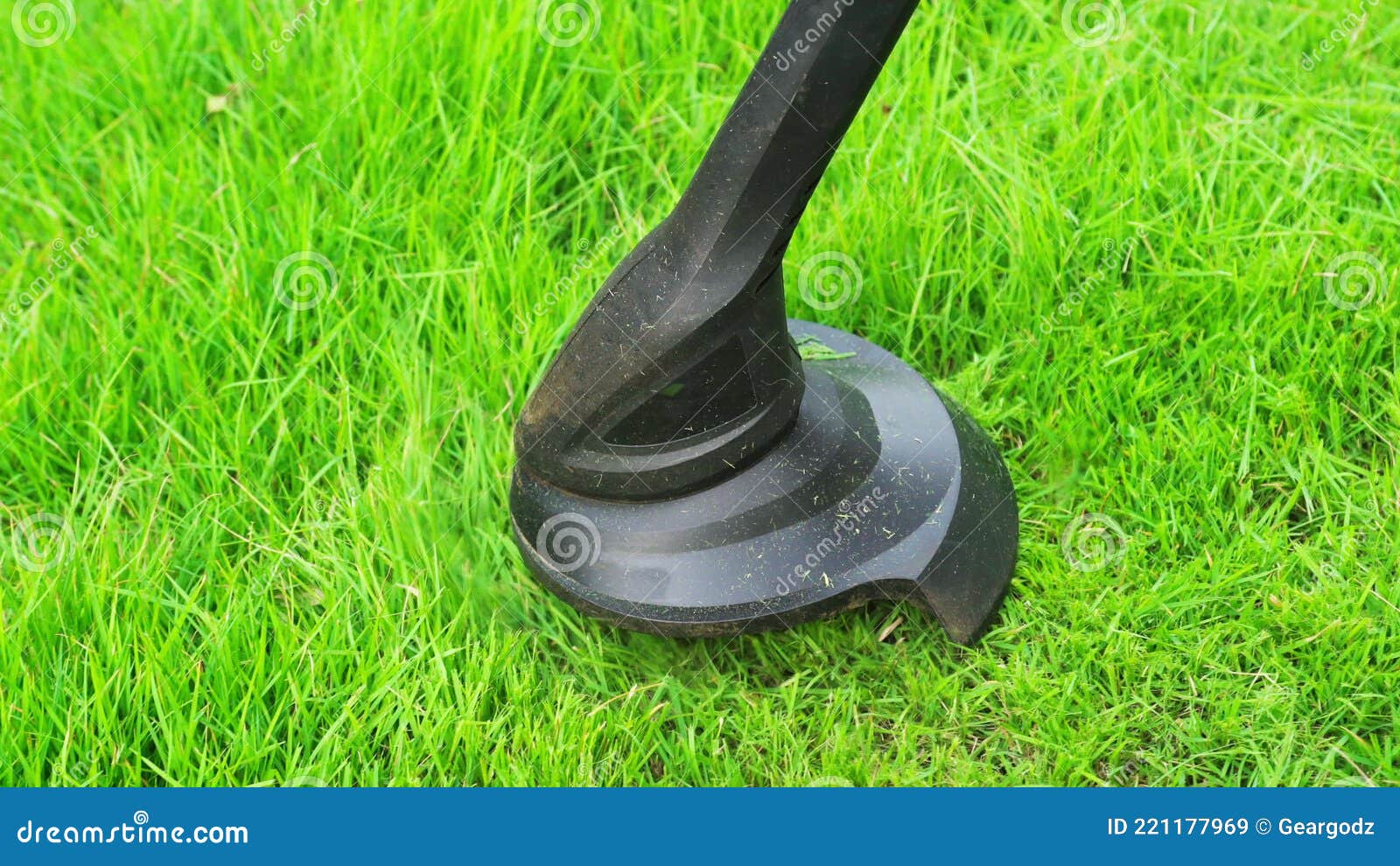 Worker Using a String Lawn Trimmer Mower Cutting Grass at Home Stock ...