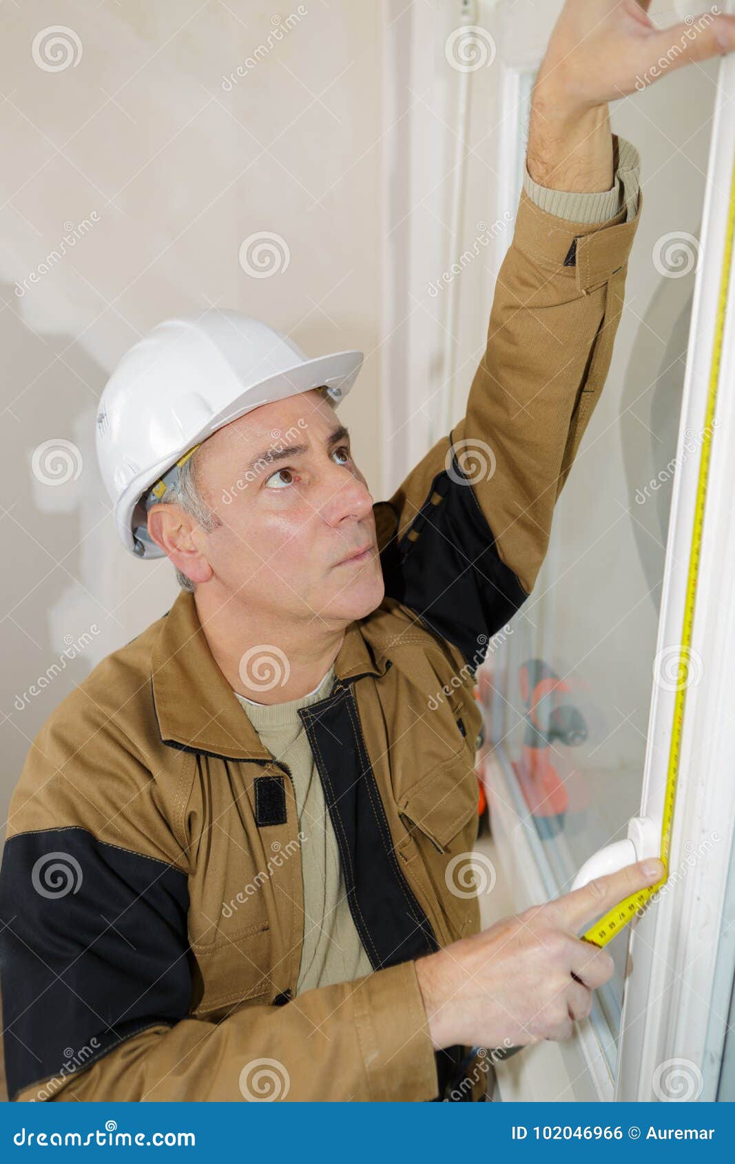 Worker Using Tape Measure Window in Construction Site Stock Photo ...