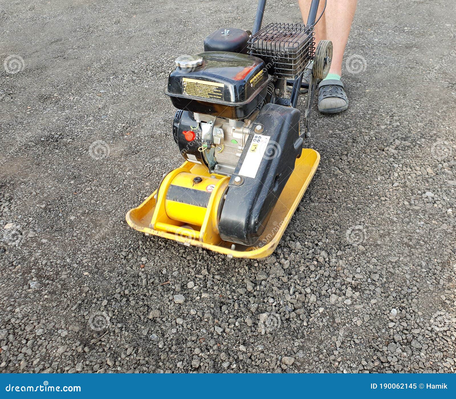 Worker Using Vibrating Plate Stock Image - Image of vibrate, machinery ...