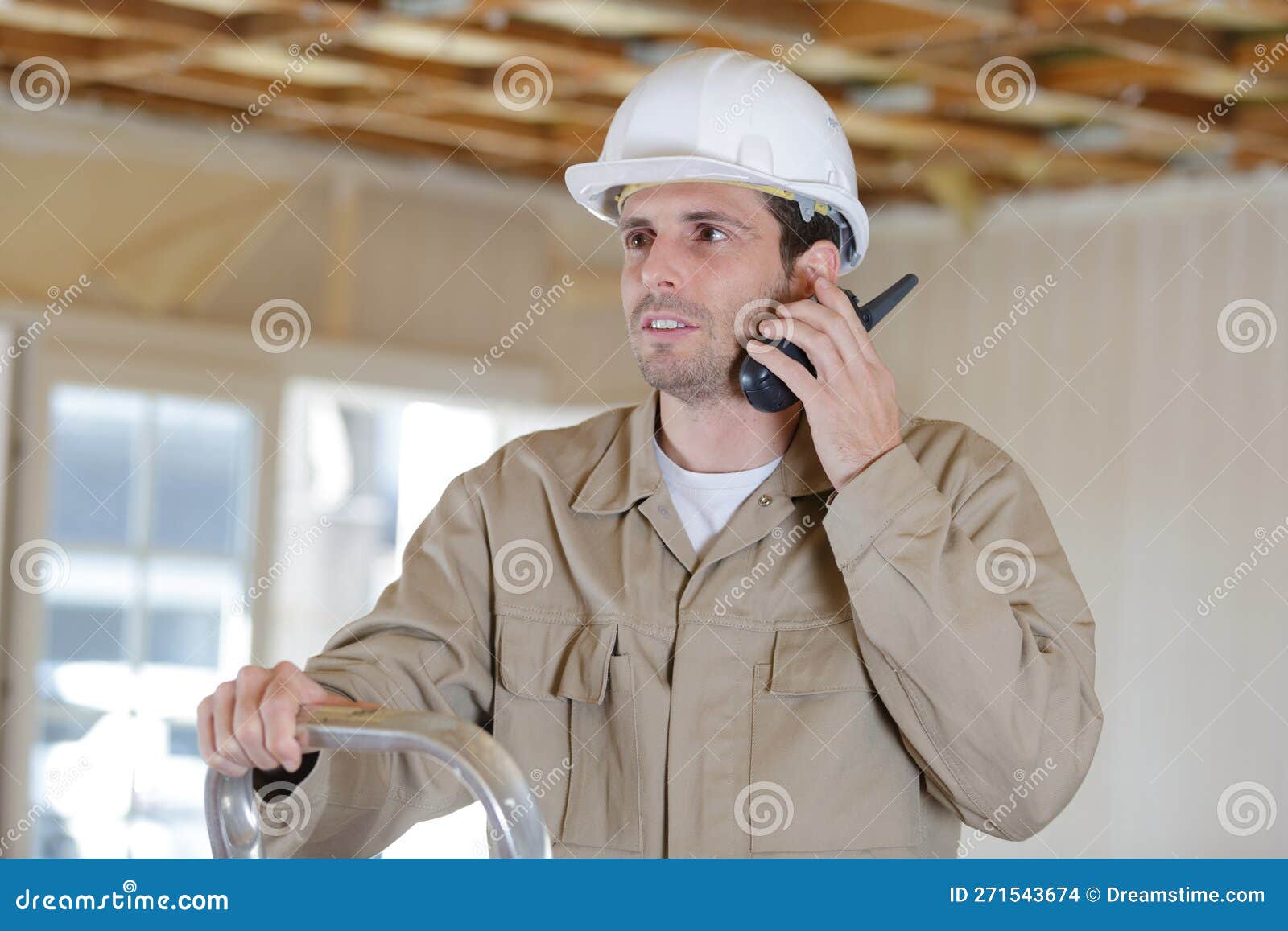 Worker using walkie talkie stock photo. Image of coworkers - 271543674