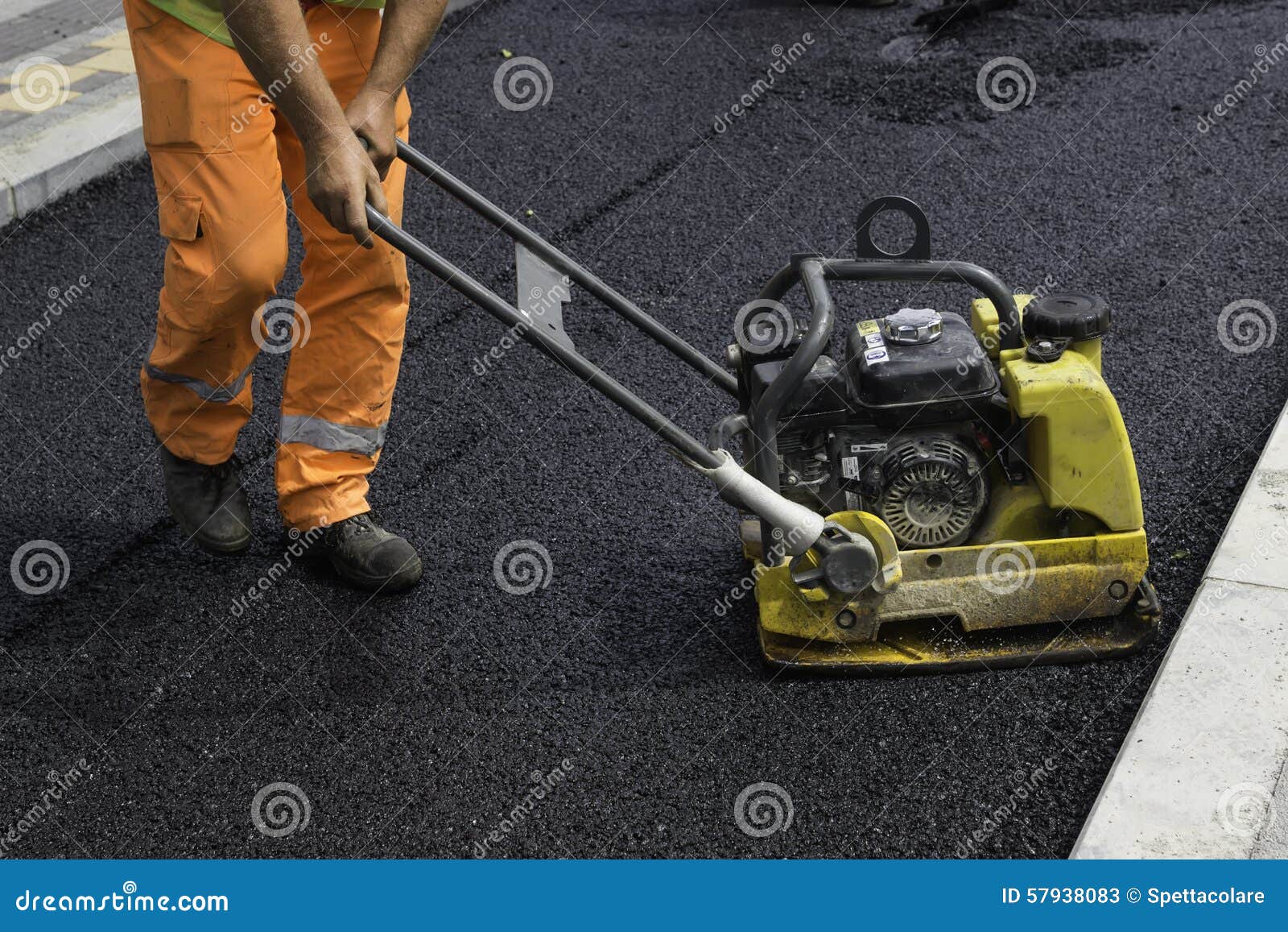 Worker with Vibrating Compactor Plate in Action Stock Image - Image of ...