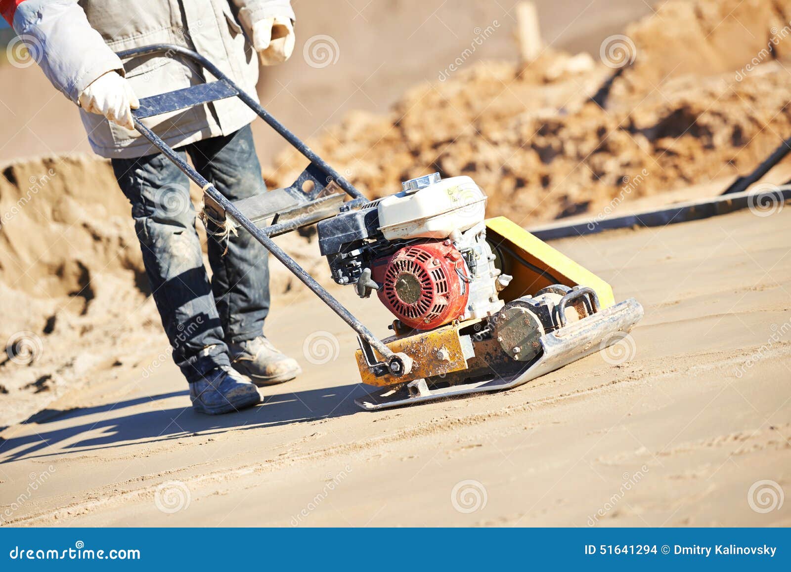 Worker with Vibration Compactor Stock Photo - Image of topping ...