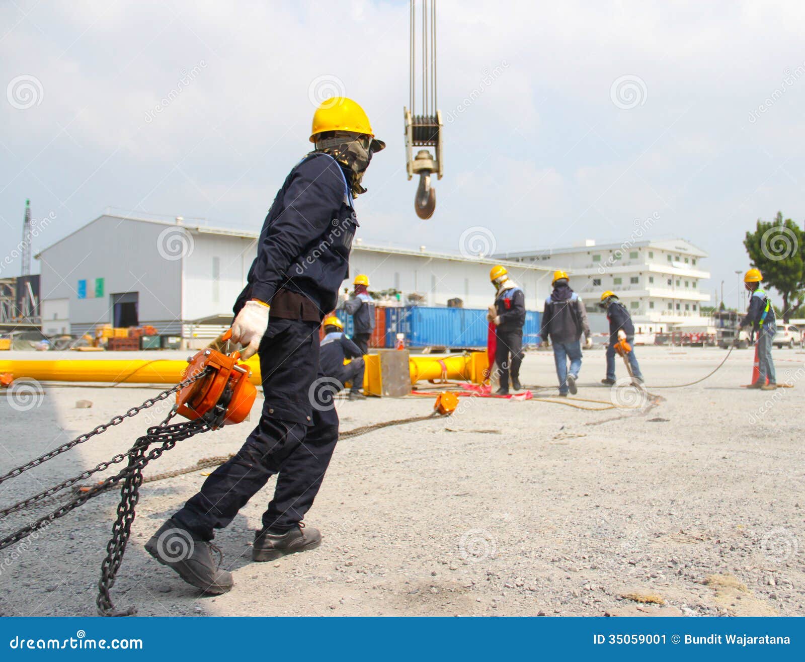 Worker walking pull chains stock image. Image of industry - 35059001