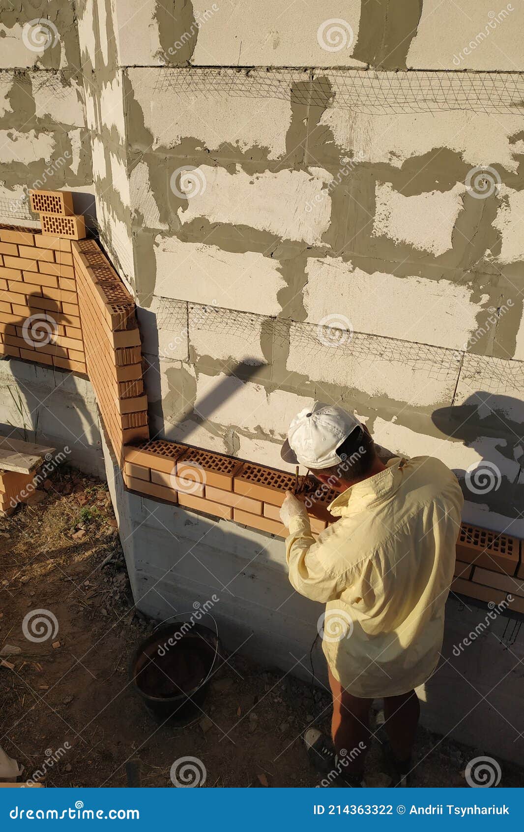 The Worker Walls The Walls Of The House With Red Brick Facade, The ...