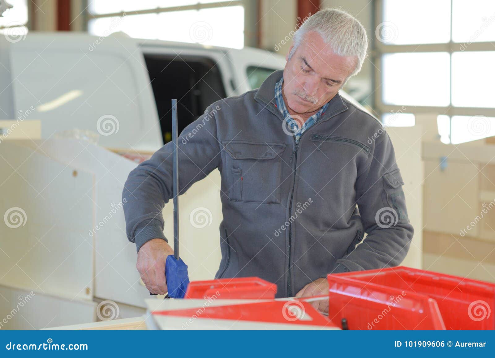 Worker at warehouse garage stock photo. Image of recreation - 101909606