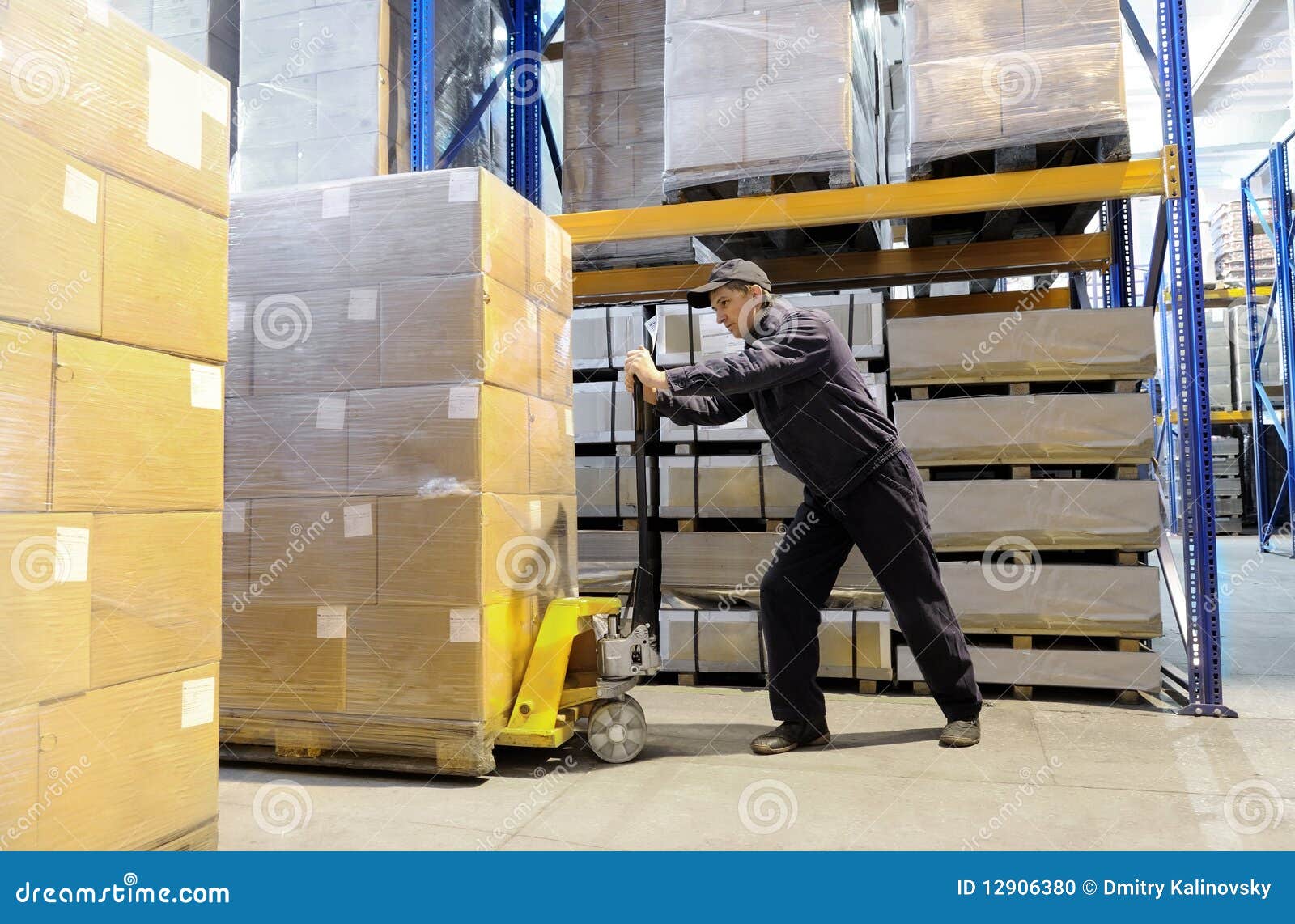 Worker at Warehouse with Loader Stock Photo - Image of selector ...