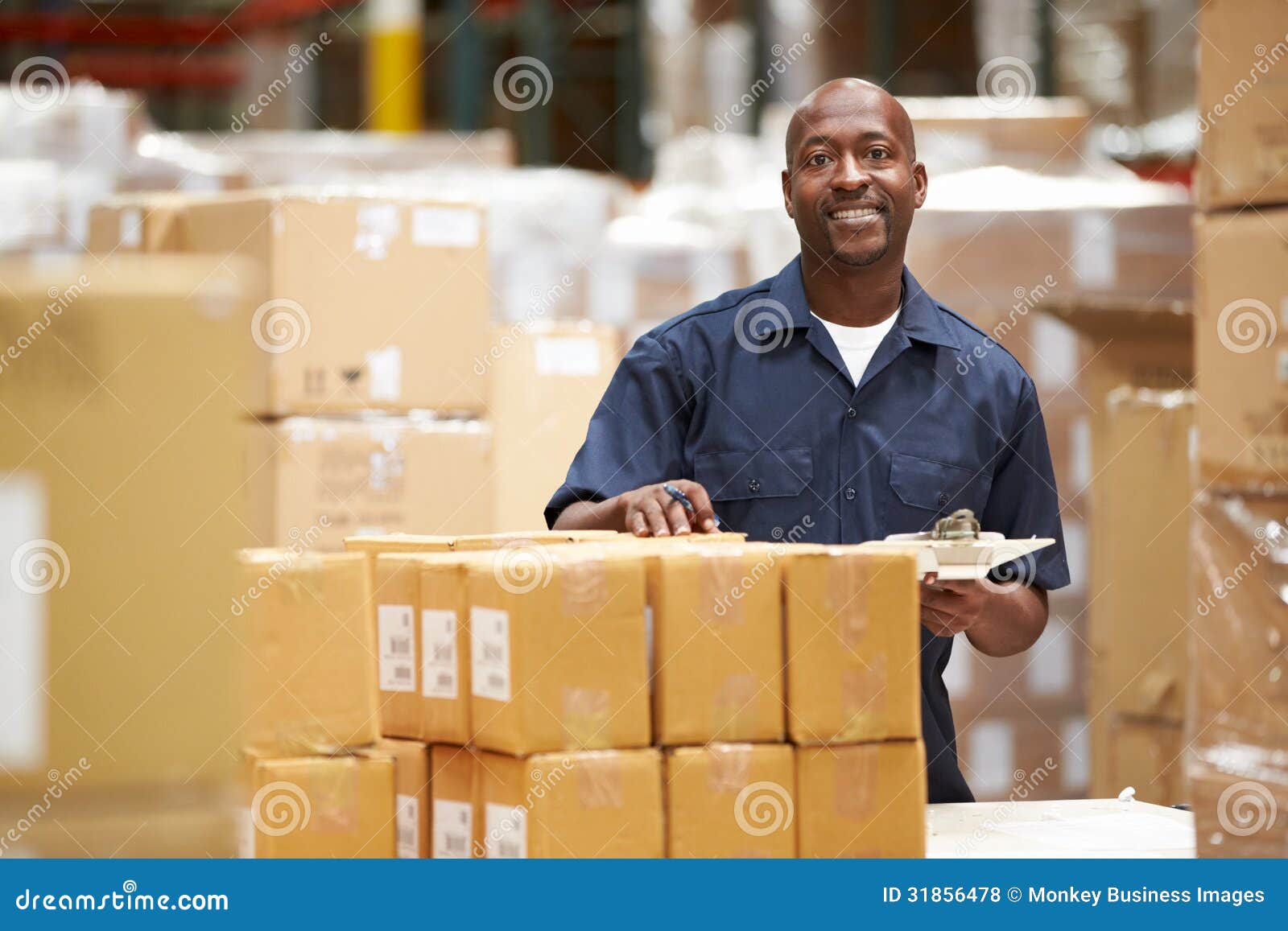 Worker in Warehouse Preparing Goods for Dispatch Stock Photo - Image of ...