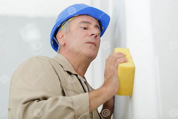 Worker washing wall stock photo. Image of worker, constructing - 277100190