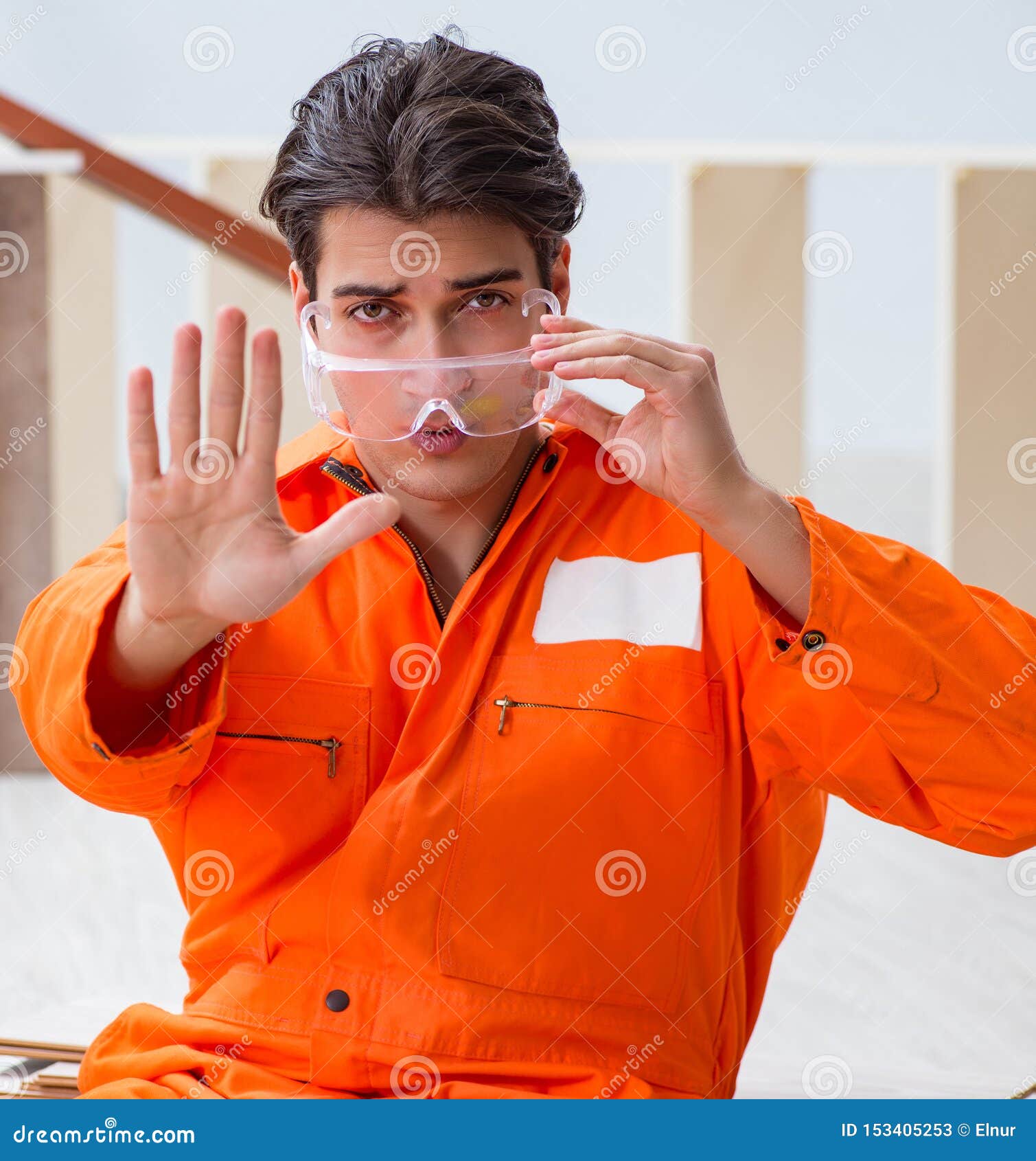 Worker Wearing Protective Goggles at Construction Site Stock Image ...