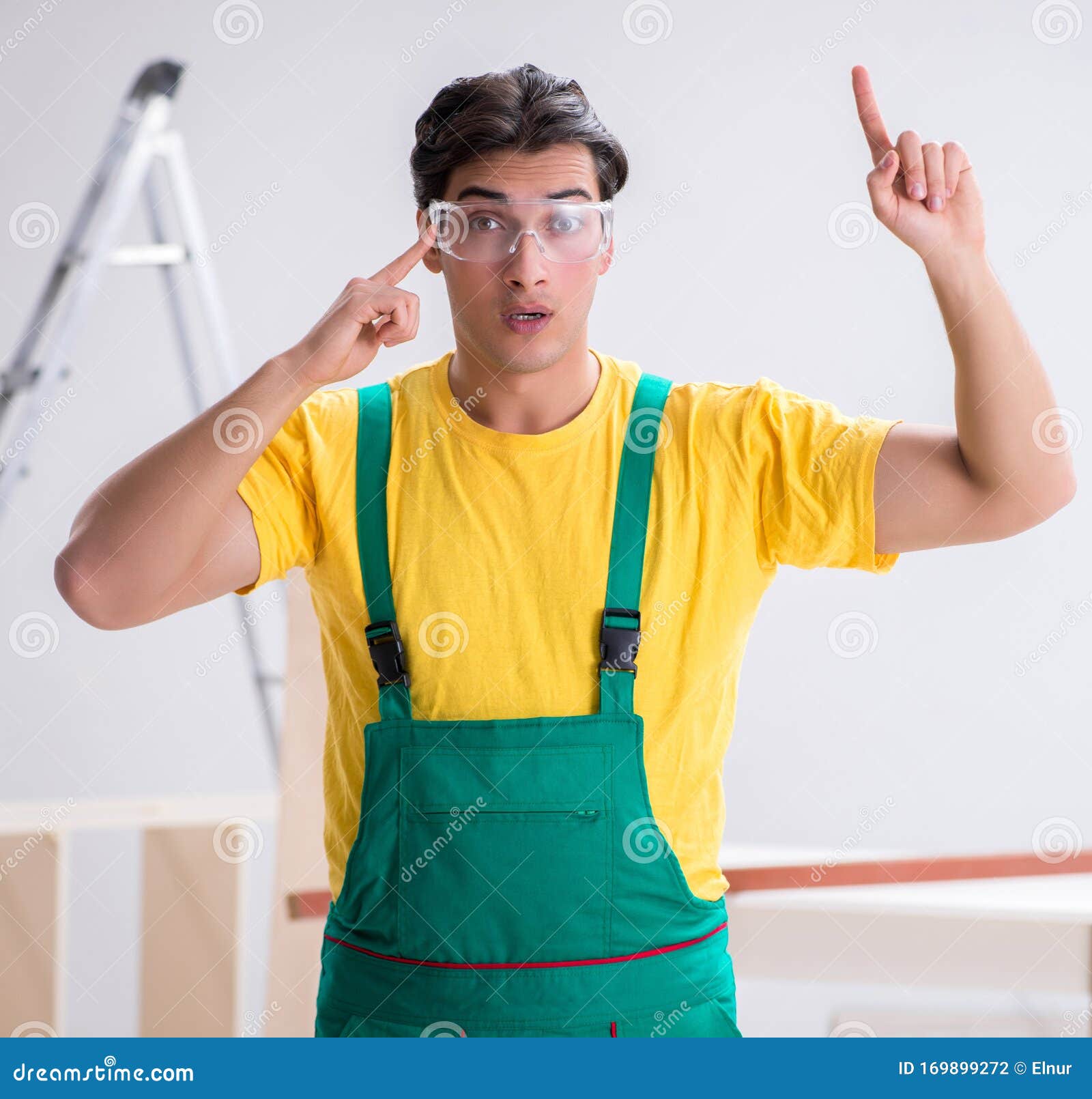 The Worker Wearing Protective Goggles at Construction Site Stock Photo ...