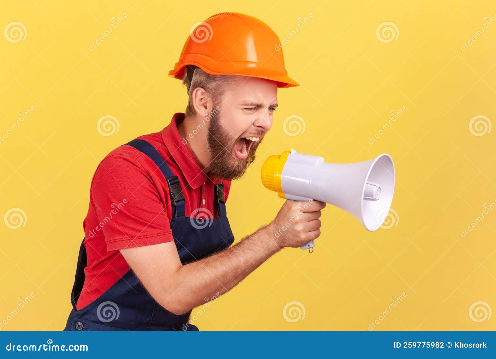 Worker Wearing Protective Helmet Holding Megaphone and Screaming with ...