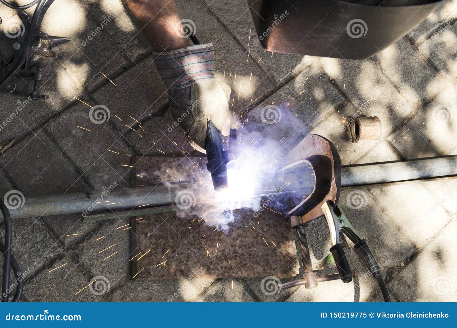 Worker Welding Metal Construction, Flash and Sparks during Work Stock ...