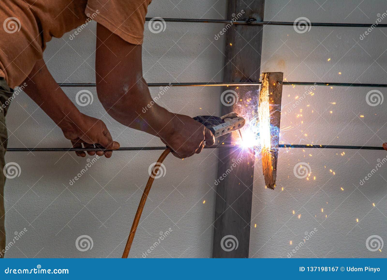 Worker welding steel bar. stock image. Image of factory - 137198167