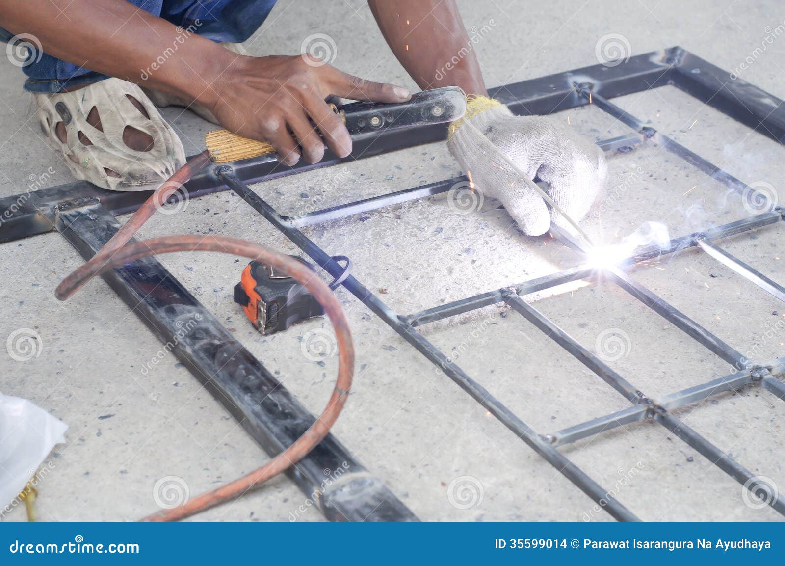 Worker welding steel bars. stock photo. Image of factory - 35599014