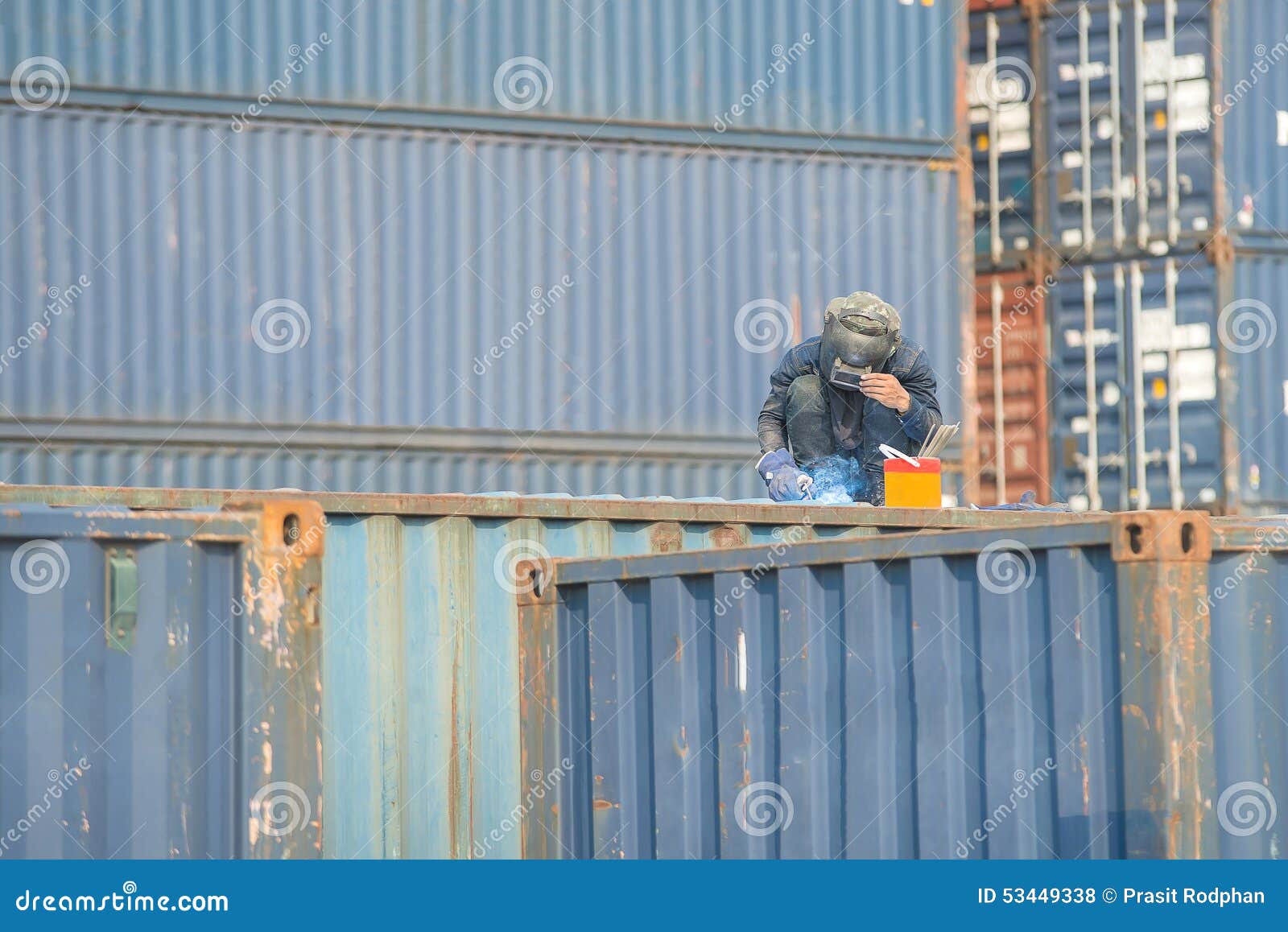 Worker Welding To Repair Container Box in Port Stock Photo - Image of ...